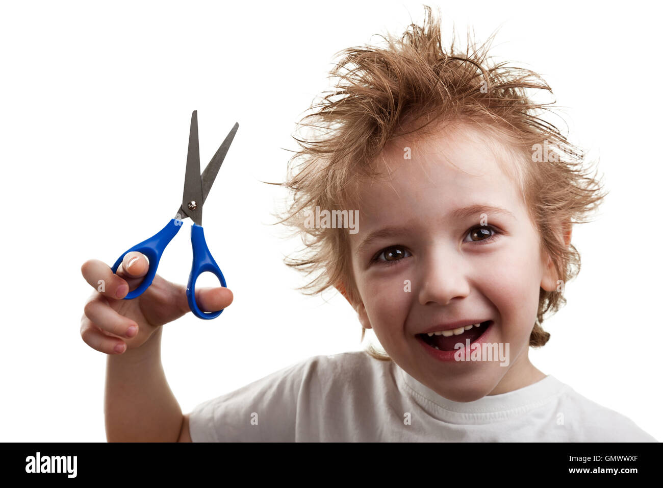 Child holding scissors Stock Photo - Alamy