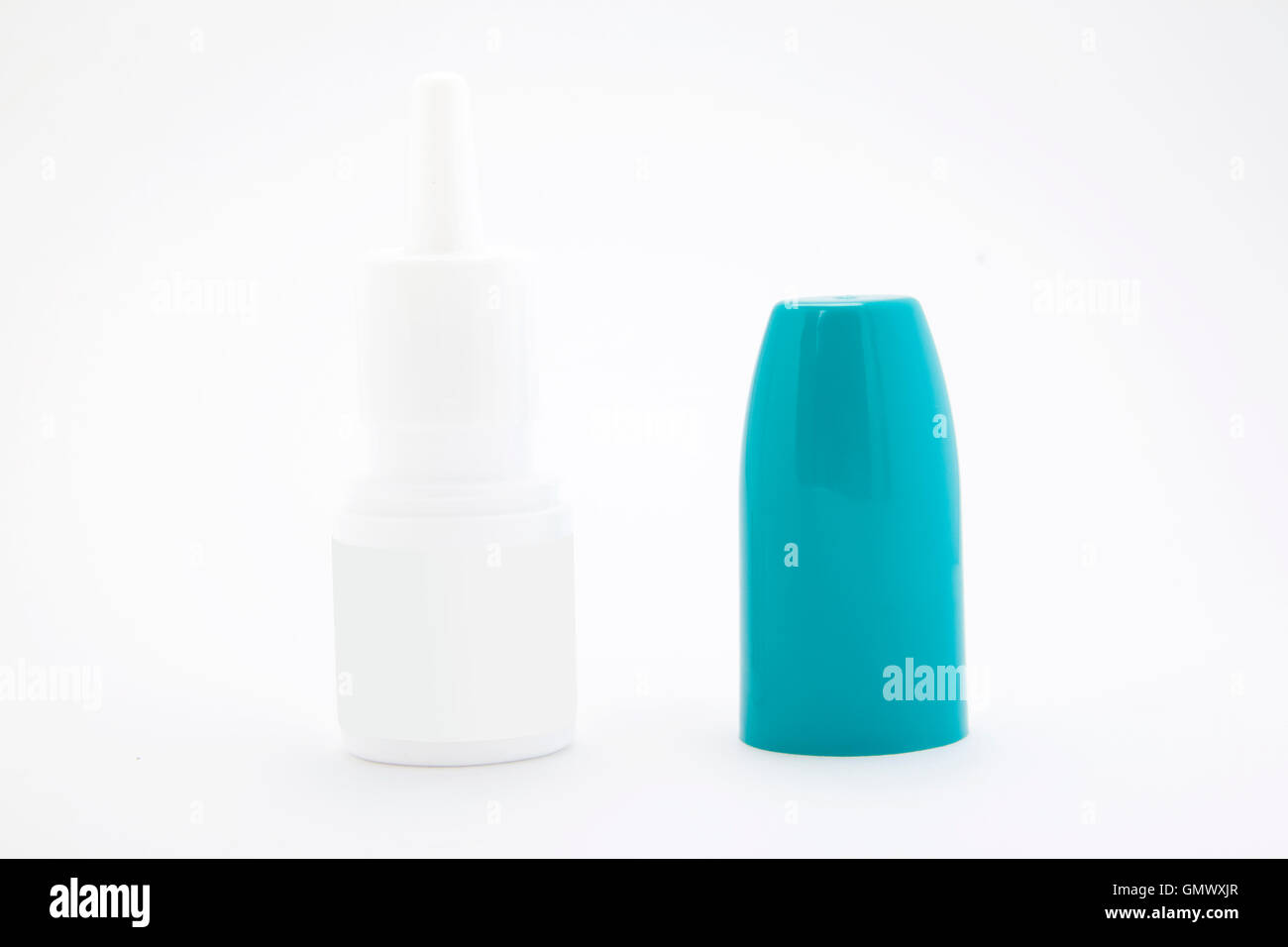 Bottle of nose drops isolated on white Stock Photo - Alamy