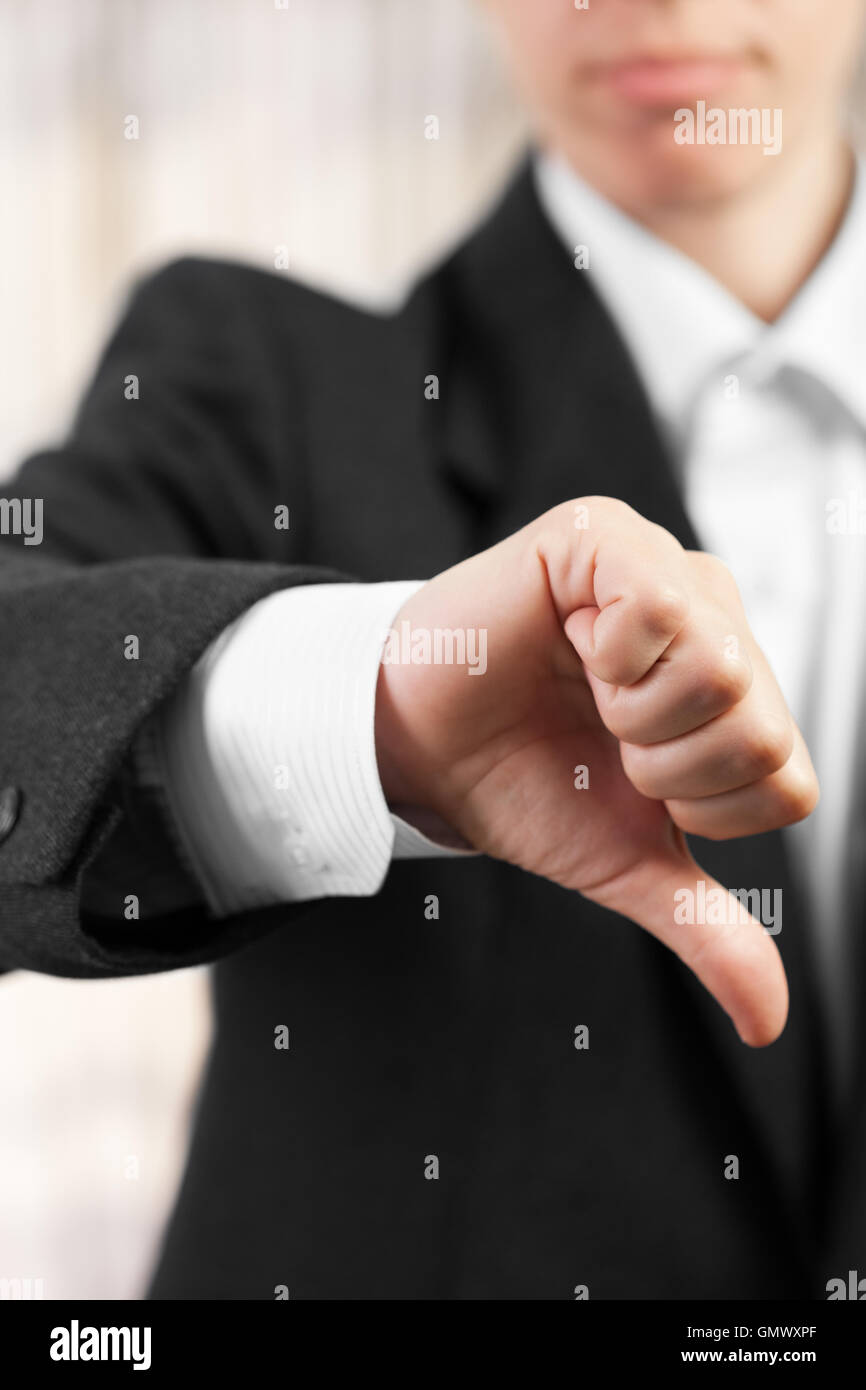 Thumb down failure sign gesture Stock Photo - Alamy
