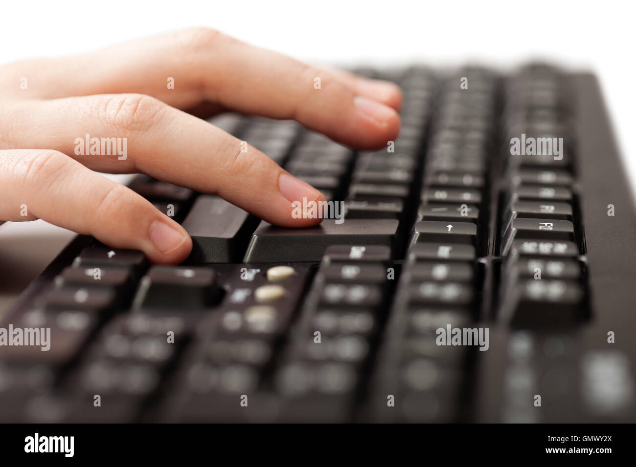 Hand typing computer keyboard Stock Photo - Alamy