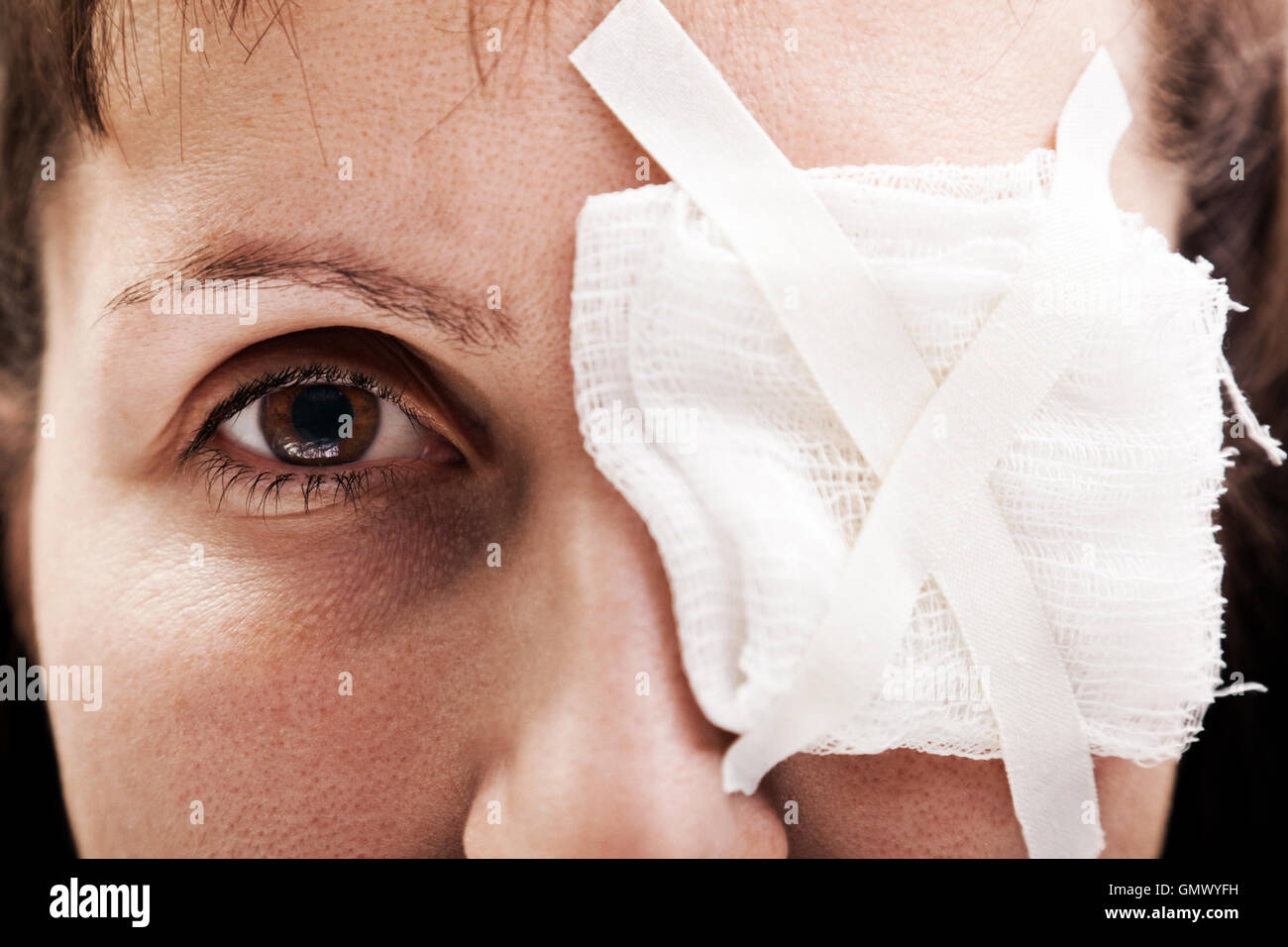 Plaster patch on wound eye Stock Photo - Alamy