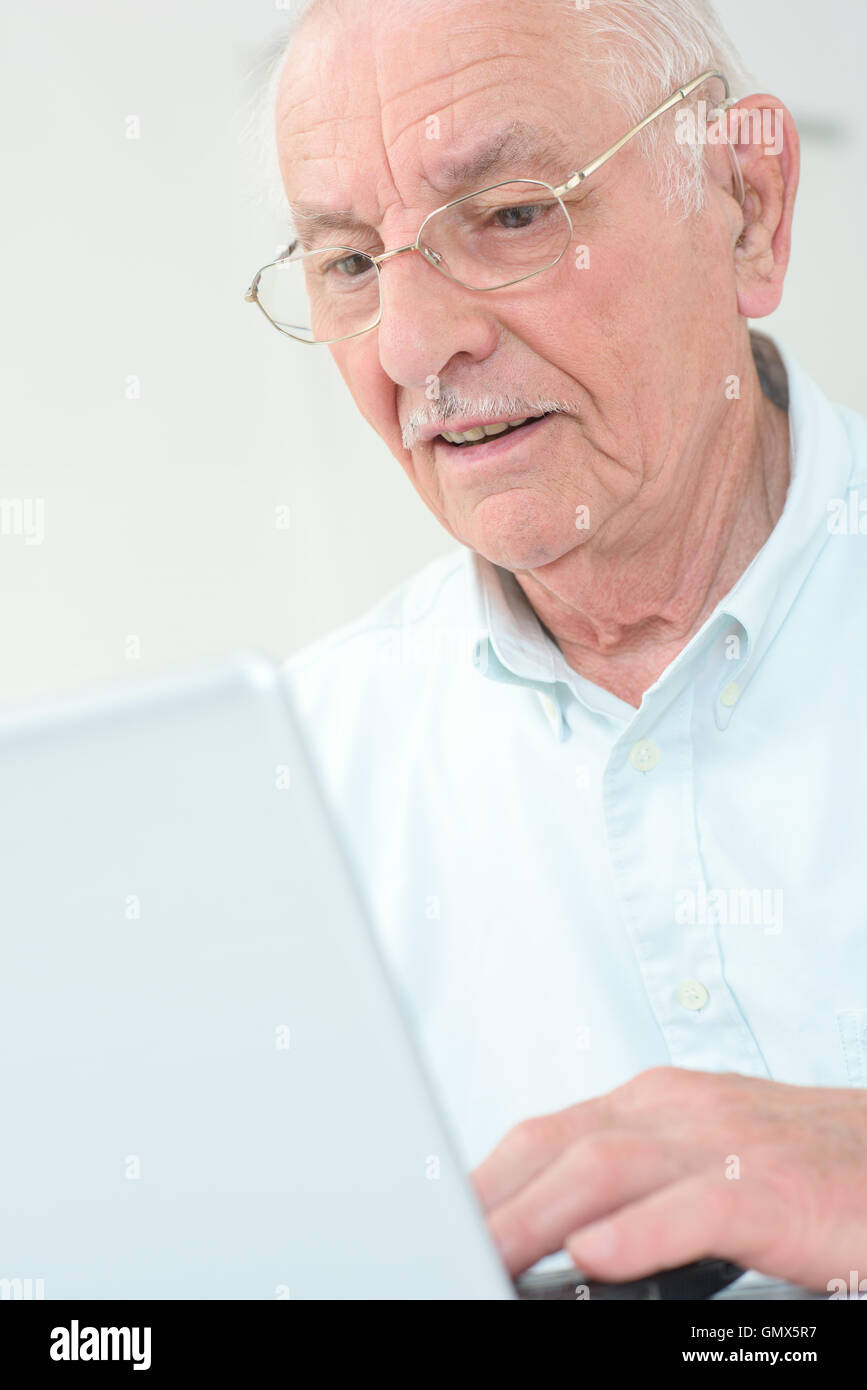 elderly man with a laptop Stock Photo - Alamy