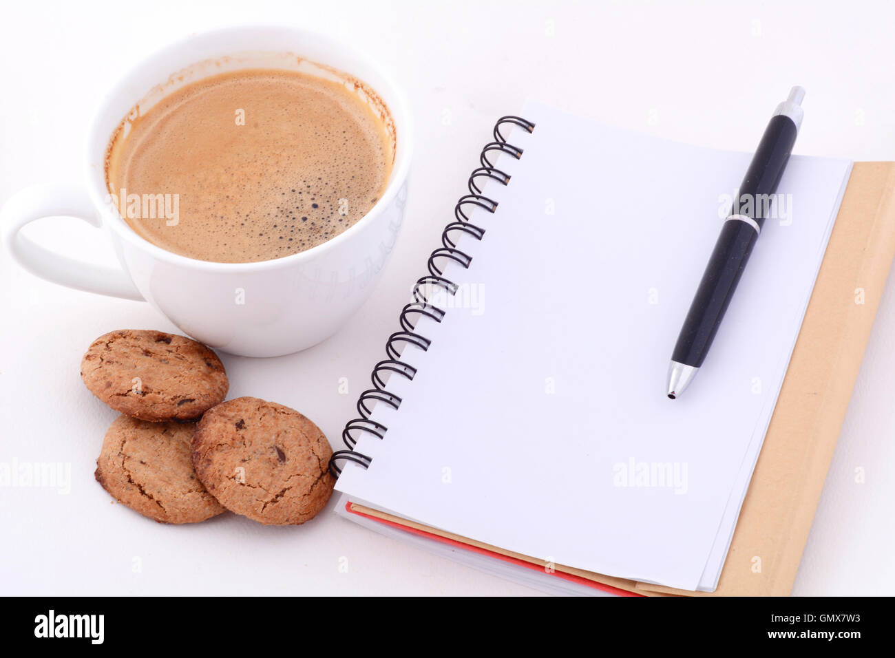 blank notebook and Cup of coffee isolated on white background. Office ...