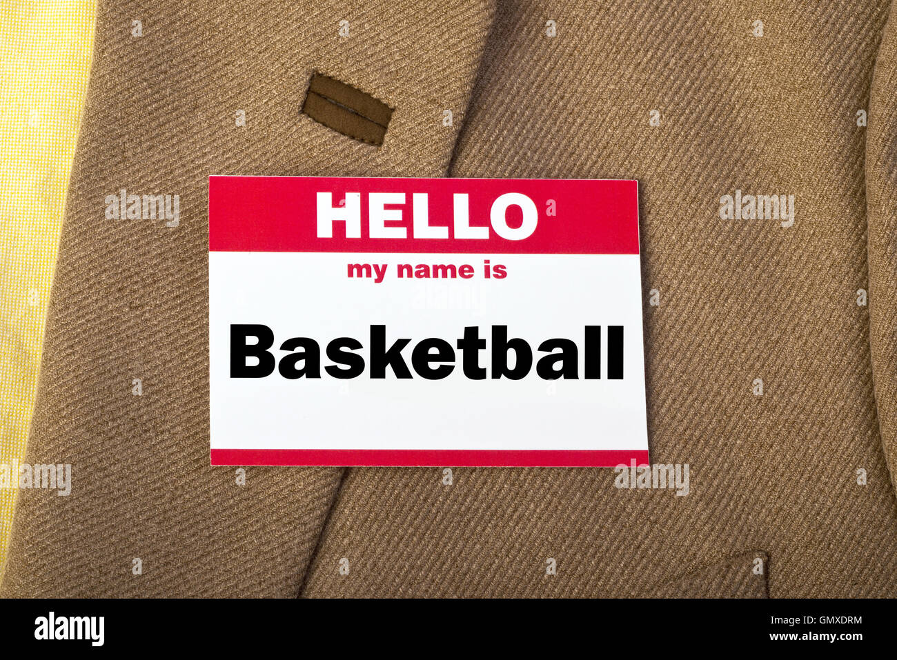 Hello my name is basketball on name tag Stock Photo - Alamy