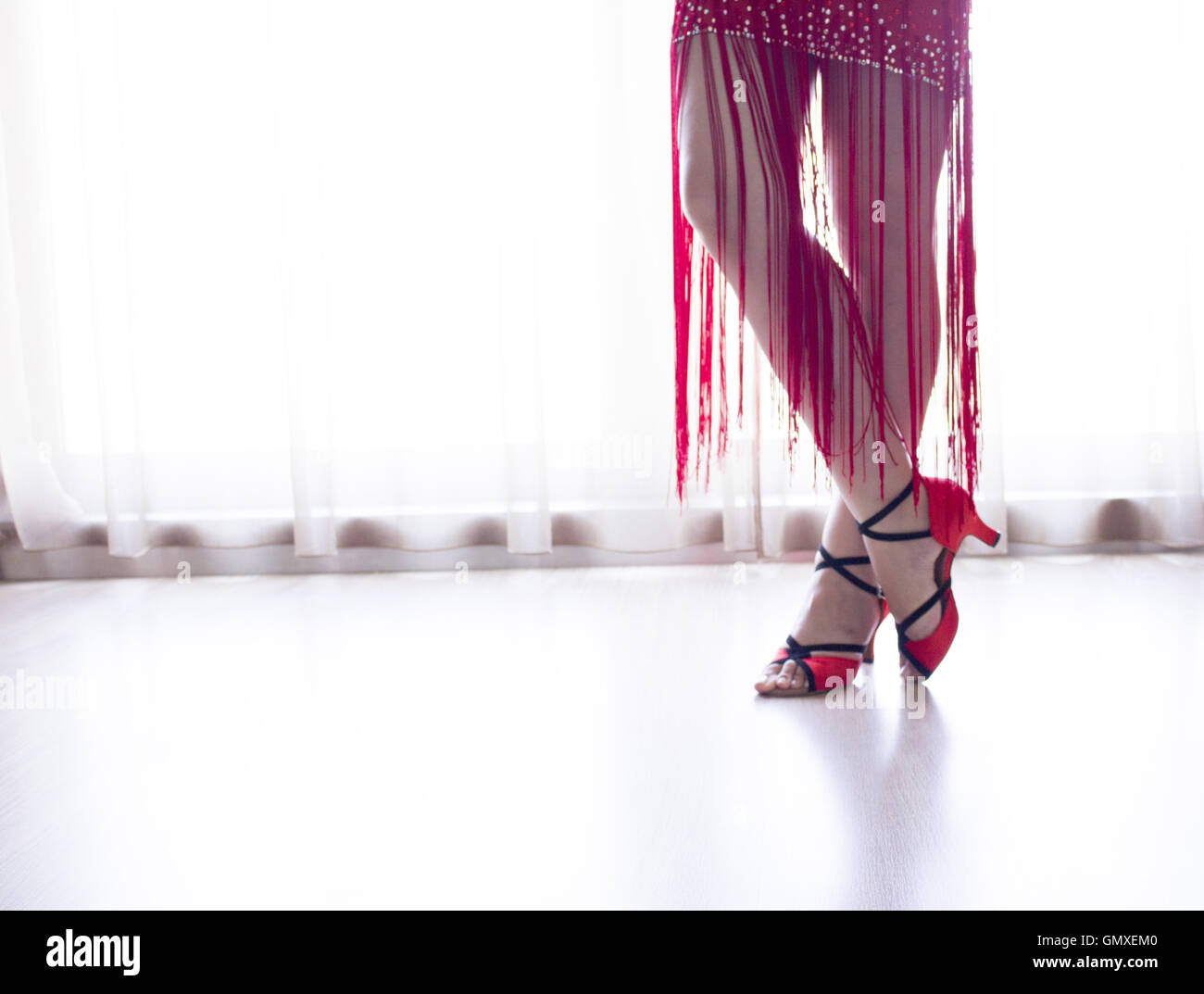 Woman dancing latin rhythms Stock Photo - Alamy