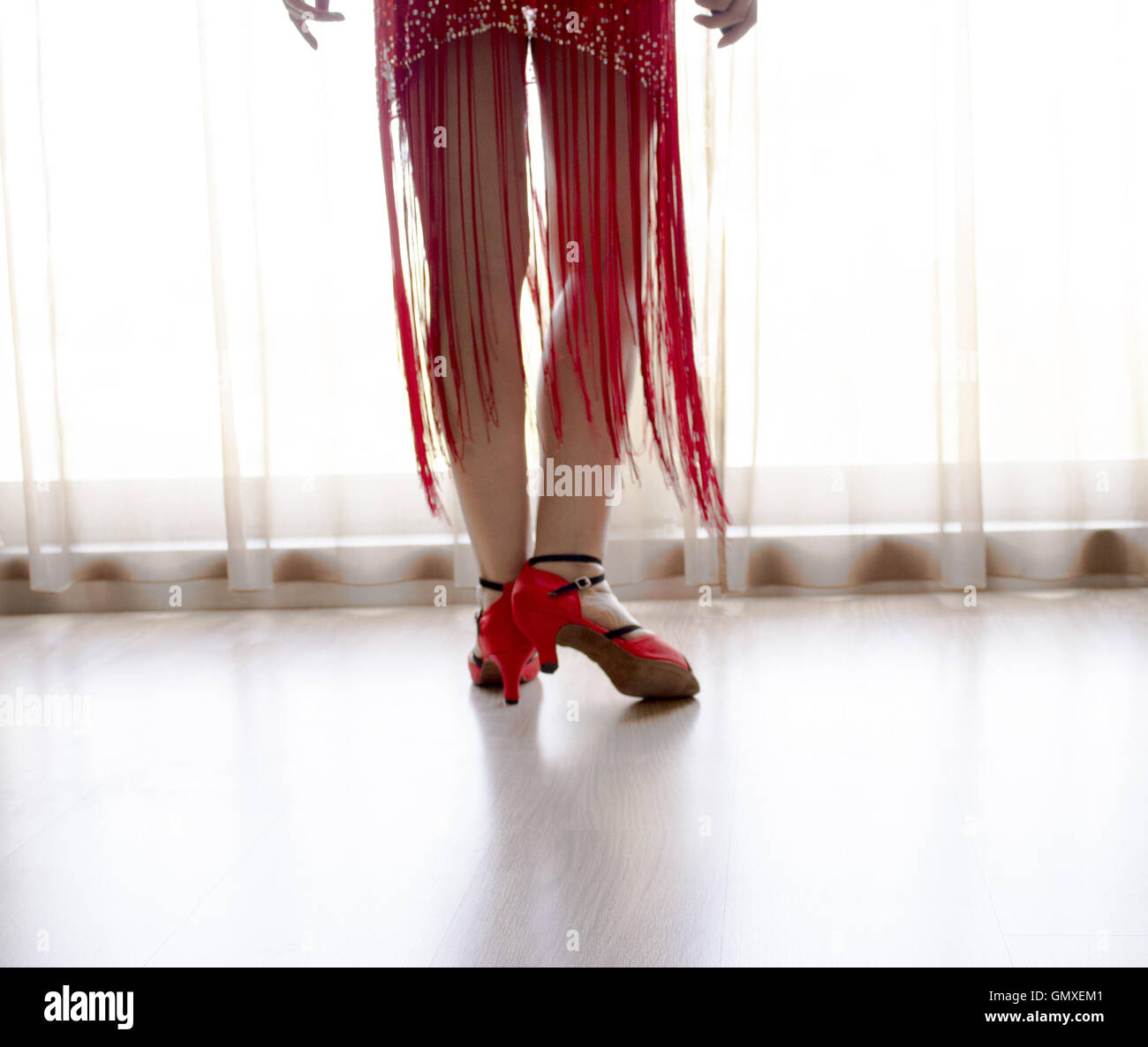 Woman dancing latin rhythms Stock Photo - Alamy