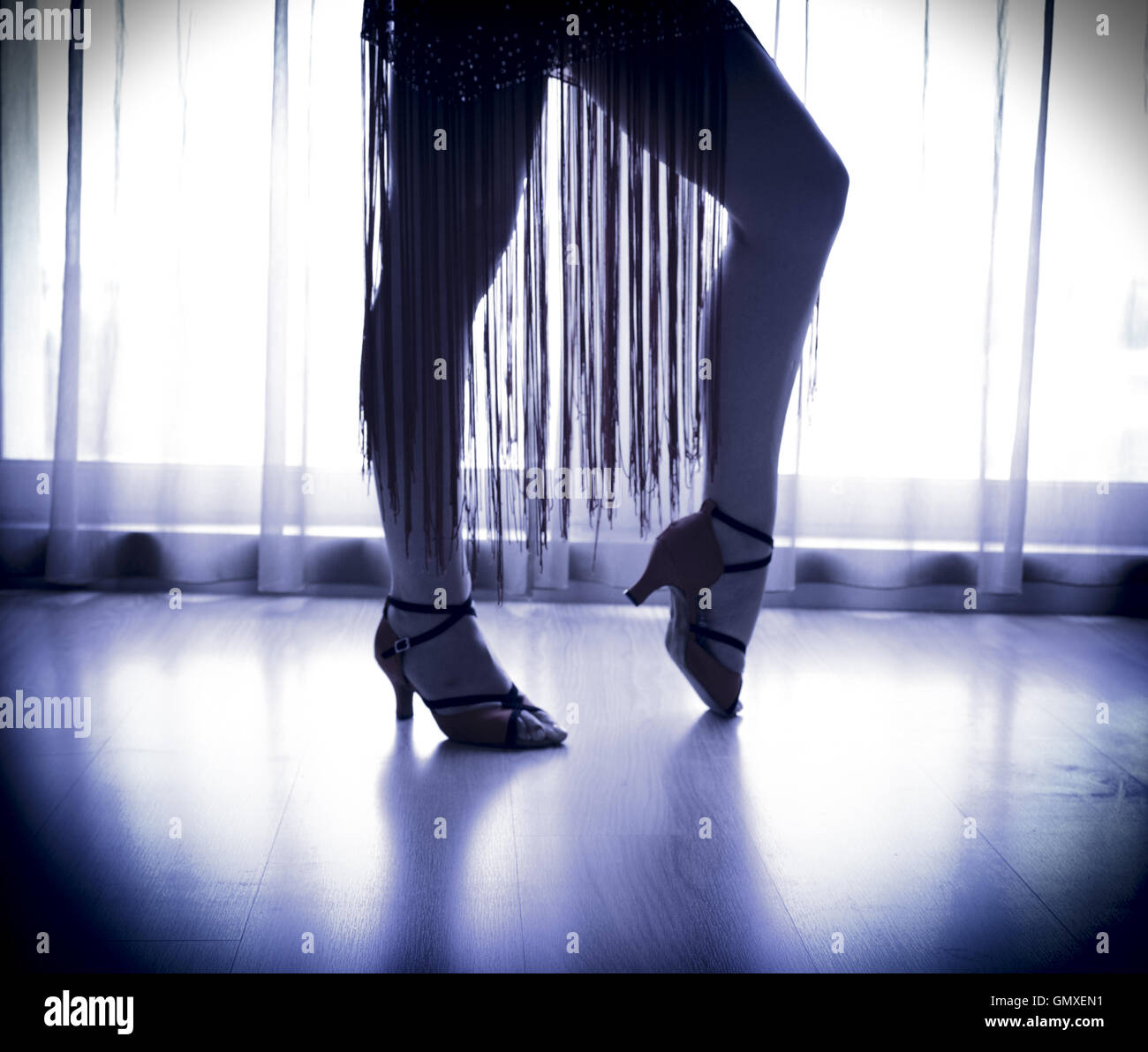 Woman dancing latin rhythms Stock Photo - Alamy