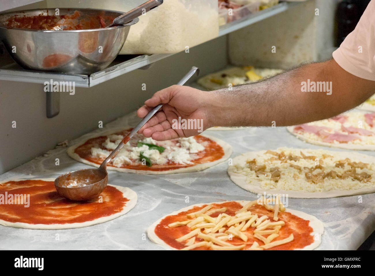 preparation of pizza Stock Photo - Alamy