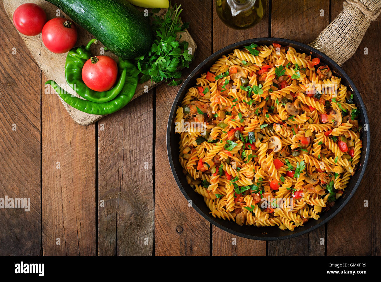 Vegetarian Vegetable pasta Fusilli with zucchini, mushrooms and capers ...