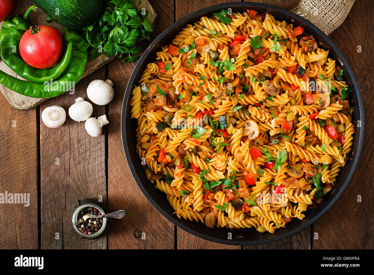 Vegetarian Vegetable pasta Fusilli with zucchini, mushrooms and capers ...