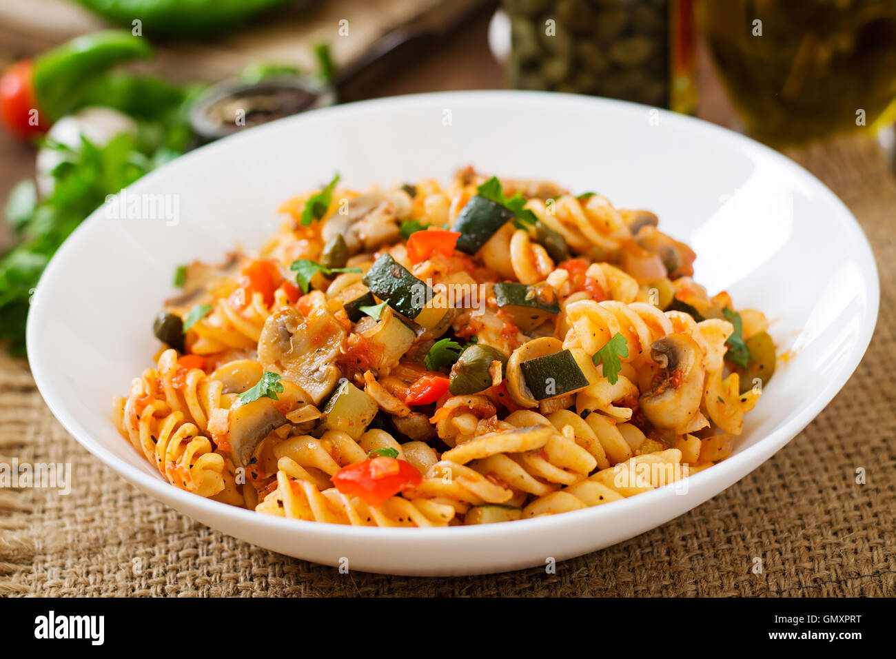 Vegetarian Vegetable pasta Fusilli with zucchini, mushrooms and capers ...