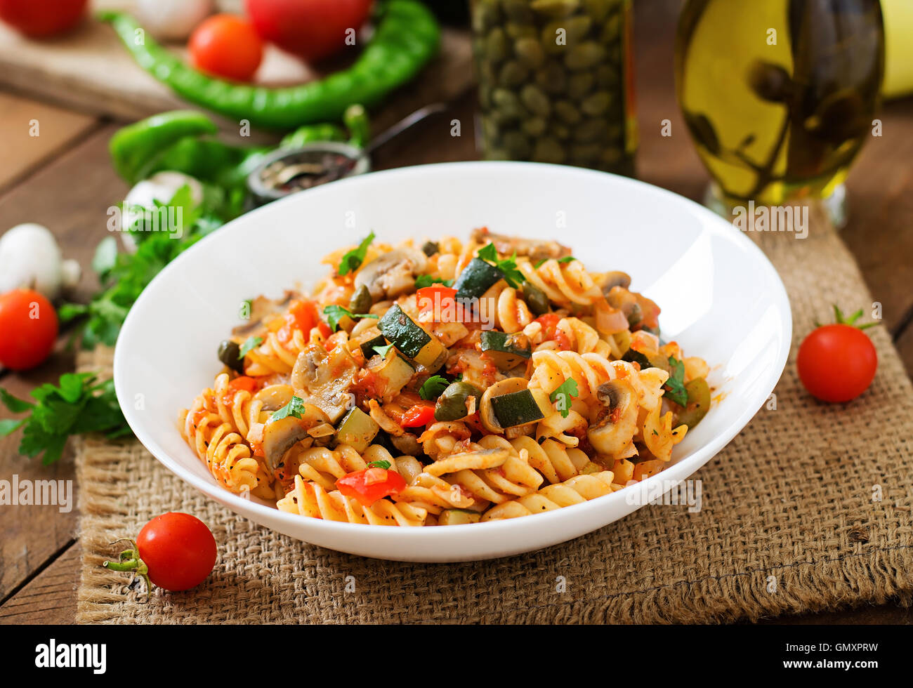 Vegetarian Vegetable pasta Fusilli with zucchini, mushrooms and capers ...