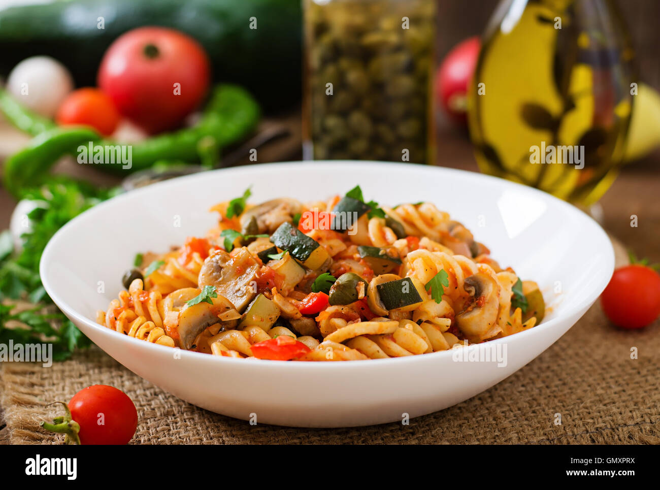 Vegetarian Vegetable pasta Fusilli with zucchini, mushrooms and capers ...