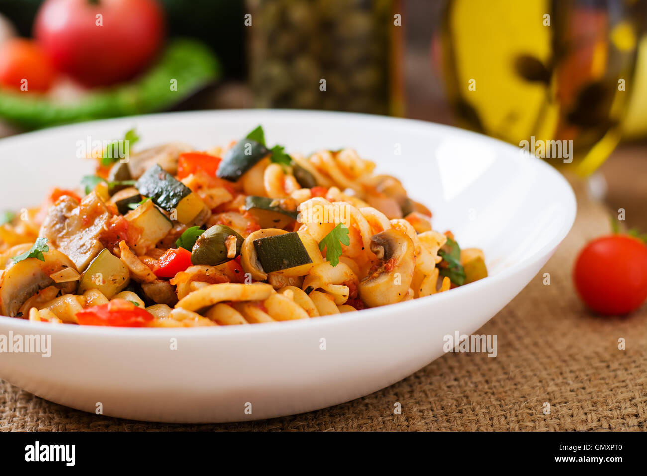 Vegetarian Vegetable pasta Fusilli with zucchini, mushrooms and capers ...