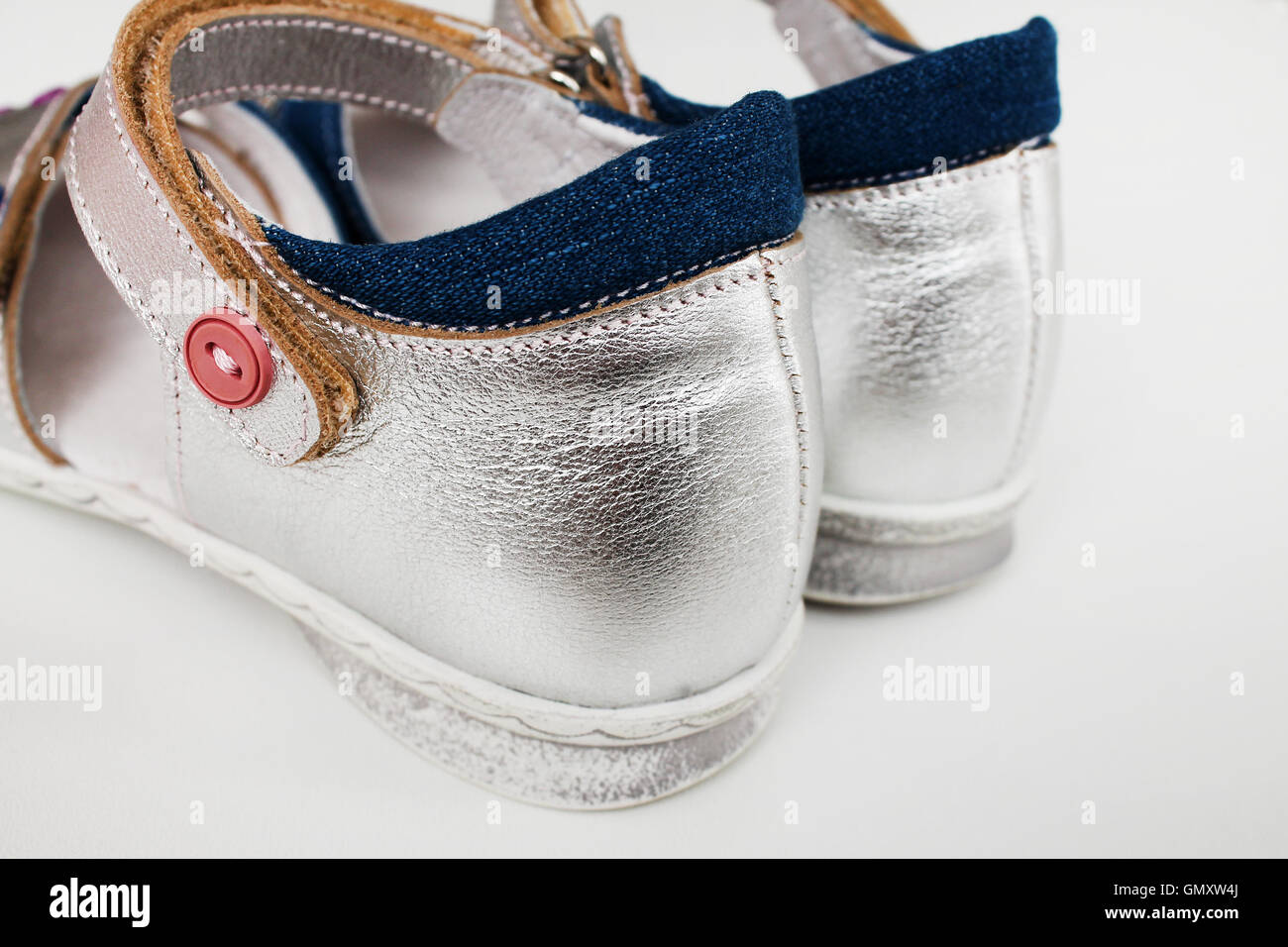 Pair of girls sandals Stock Photo - Alamy