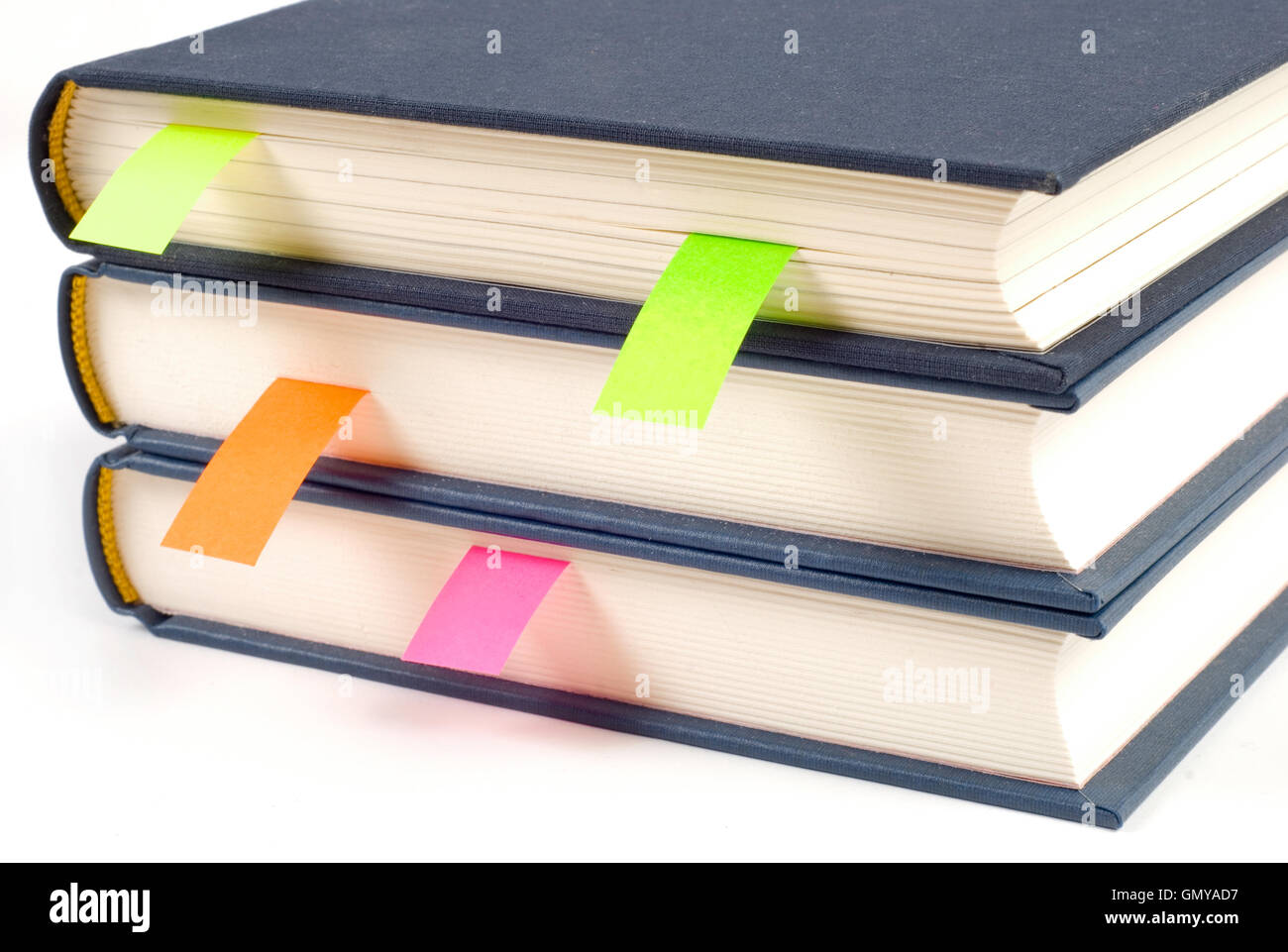 Books with bookmarks isolated on white background Stock Photo - Alamy