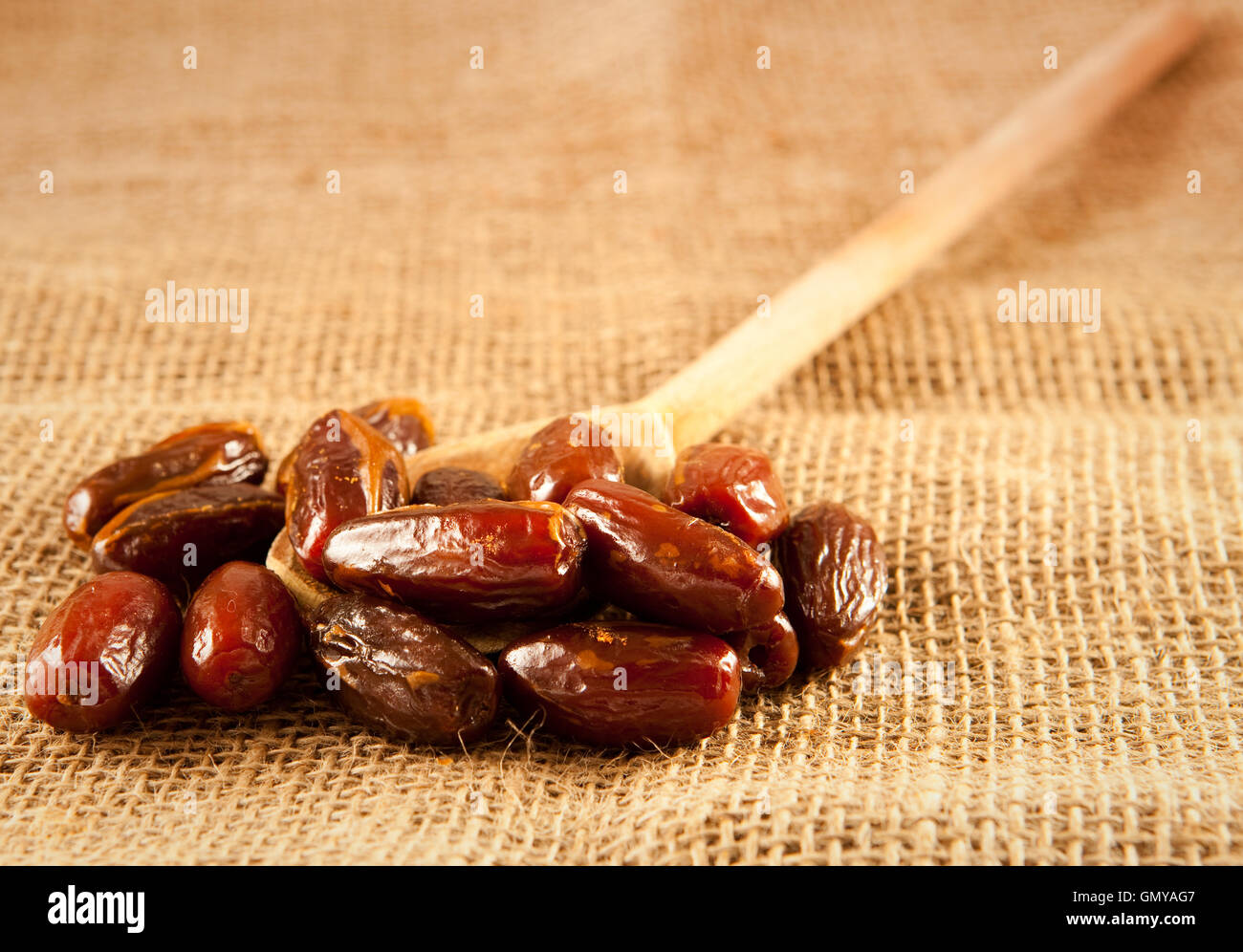 Fresh dates in wooden hi-res stock photography and images - Alamy