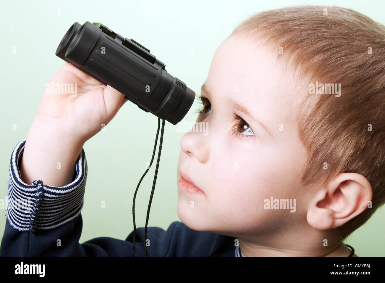 Child with binoculars Stock Photo - Alamy