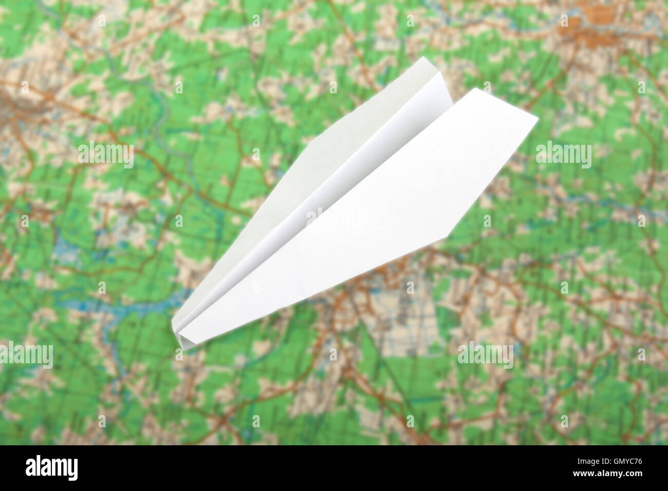 Airplane on map Stock Photo - Alamy
