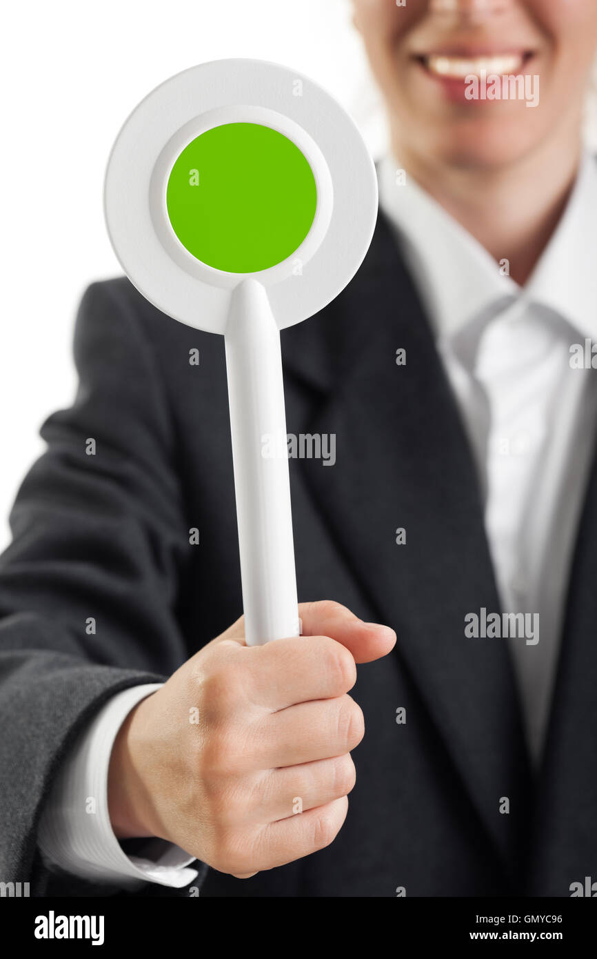 White hand holding auction paddle hi-res stock photography and images ...