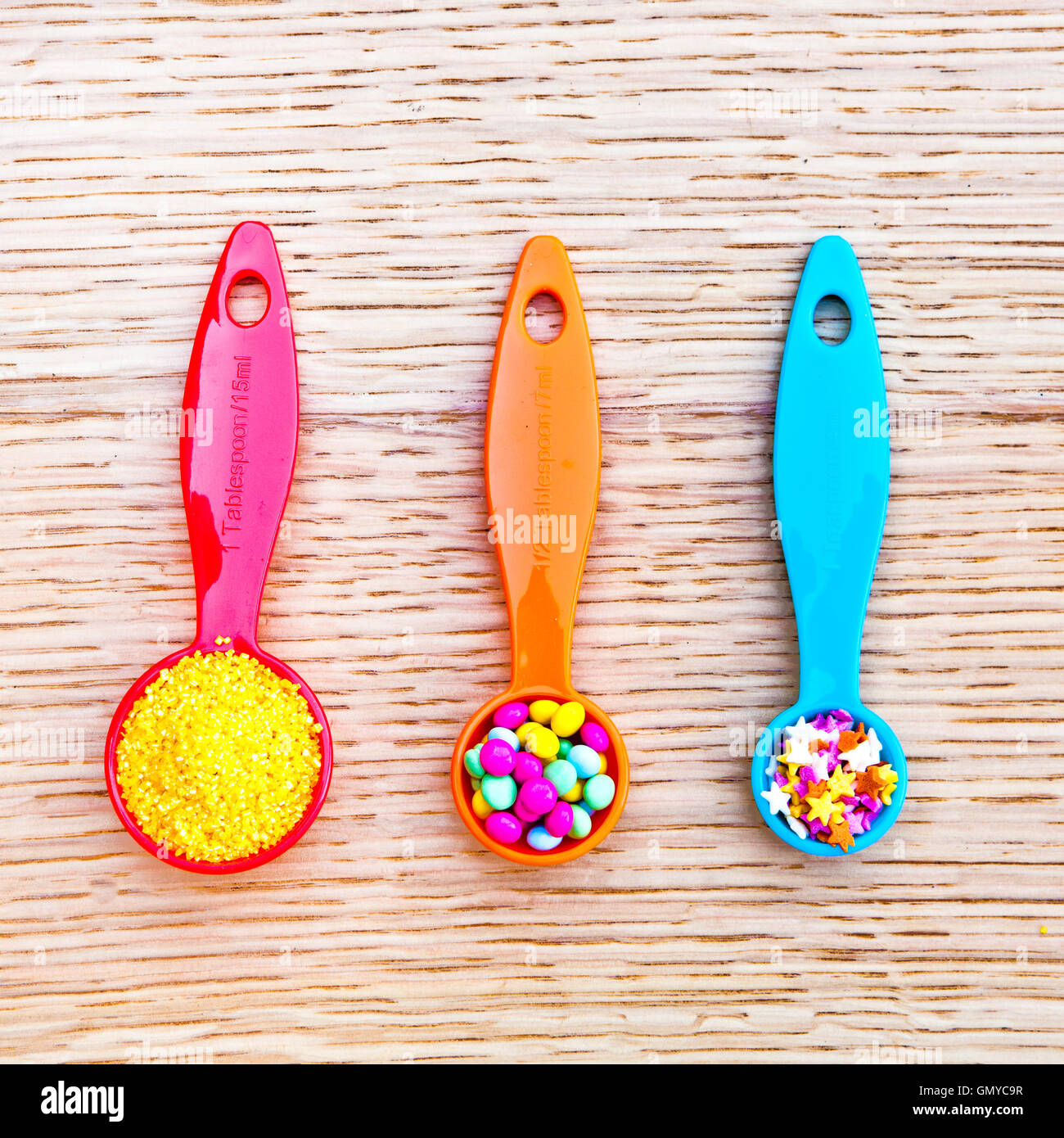 Plastic measuring spoons Stock Photo - Alamy