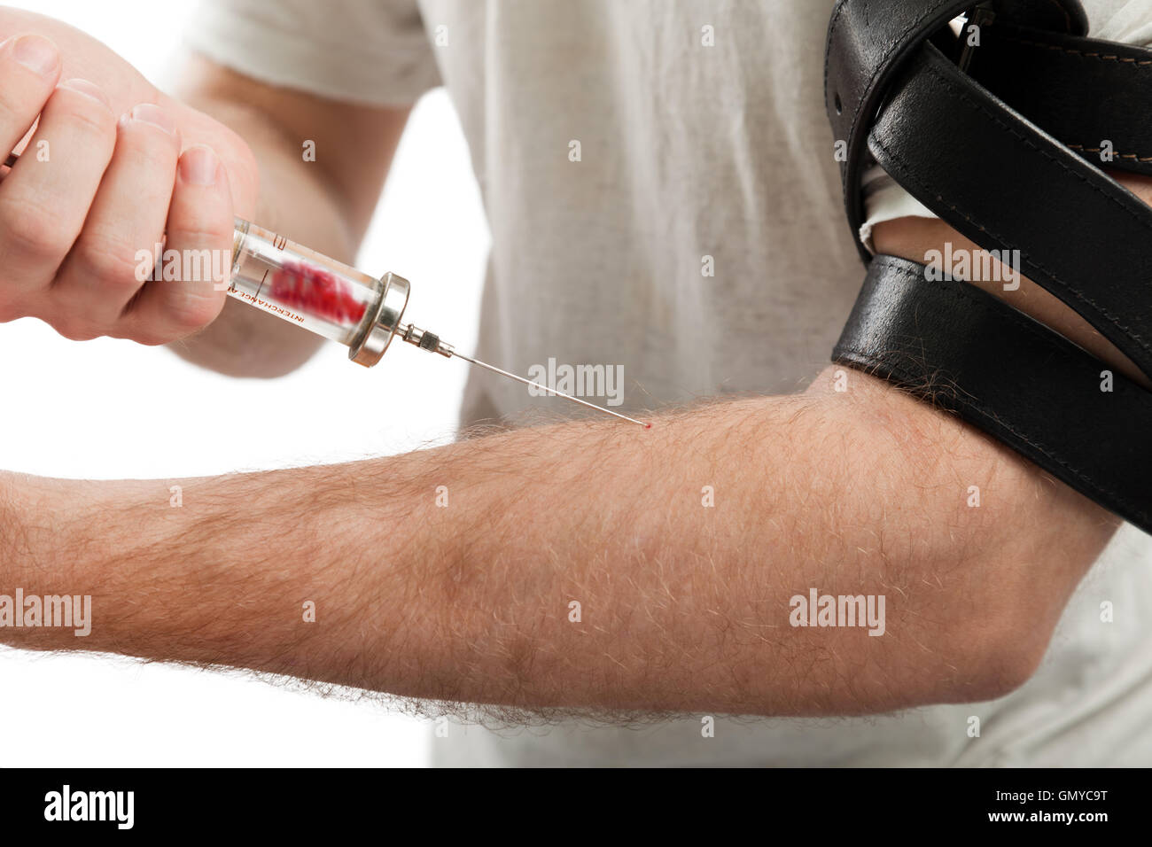 Addict injecting syringe Stock Photo - Alamy