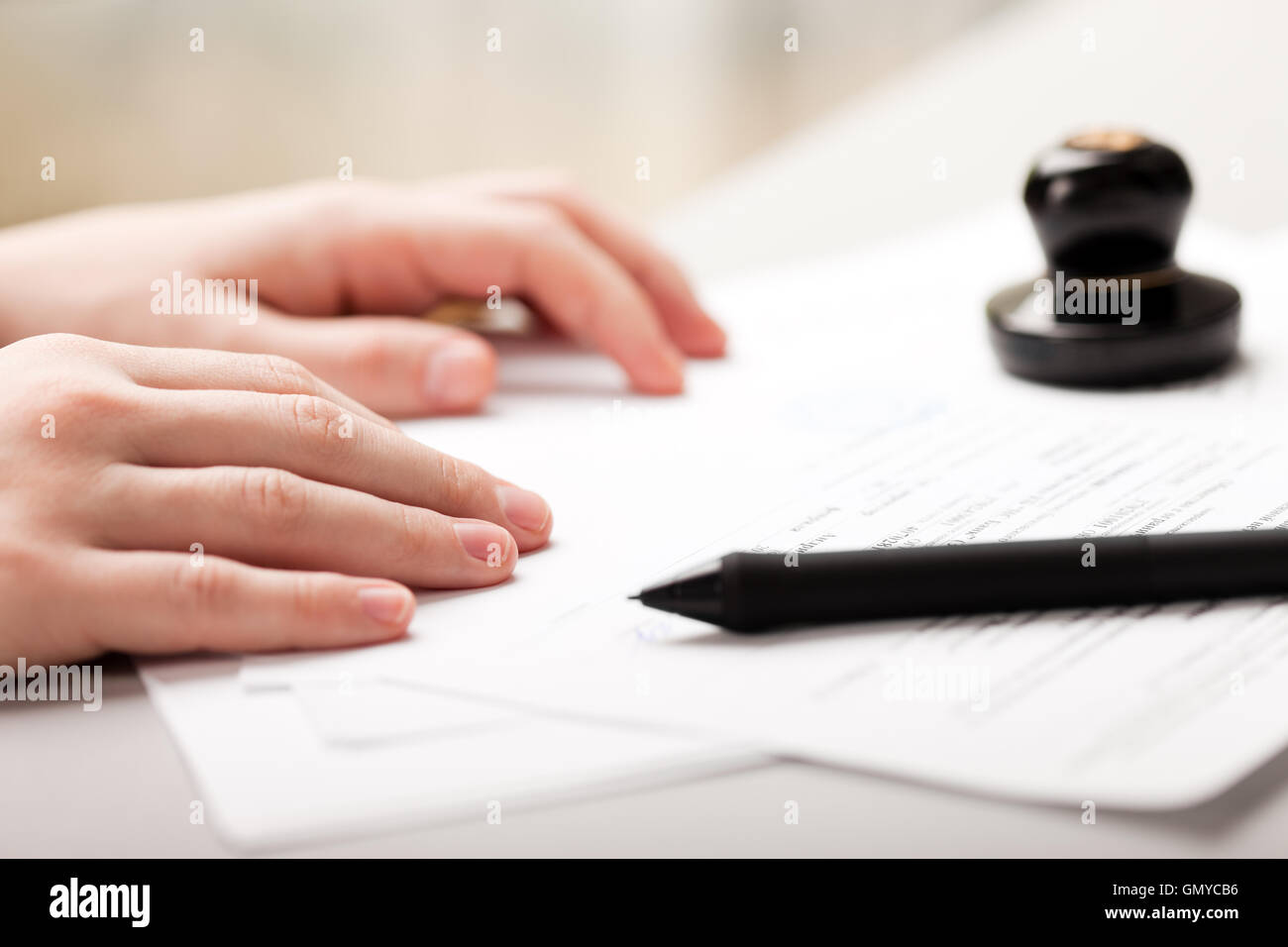 Pen writing business document Stock Photo - Alamy