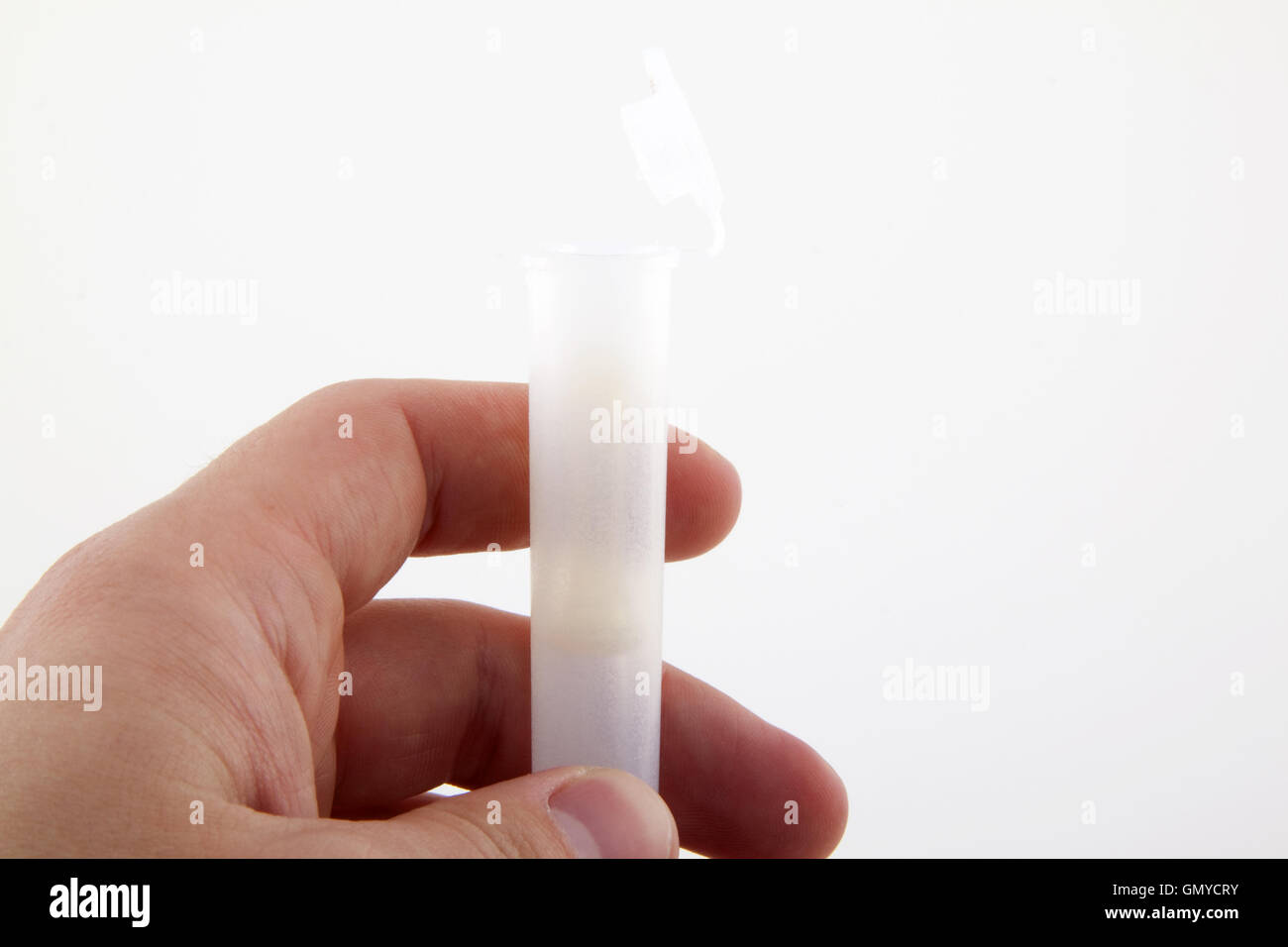 Medical tube in hand Stock Photo - Alamy