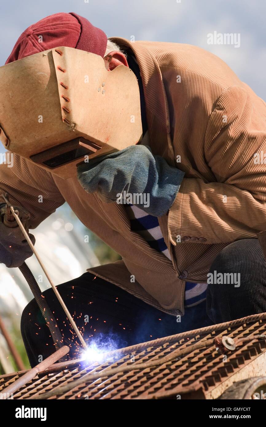 Old welder is working Stock Photo - Alamy