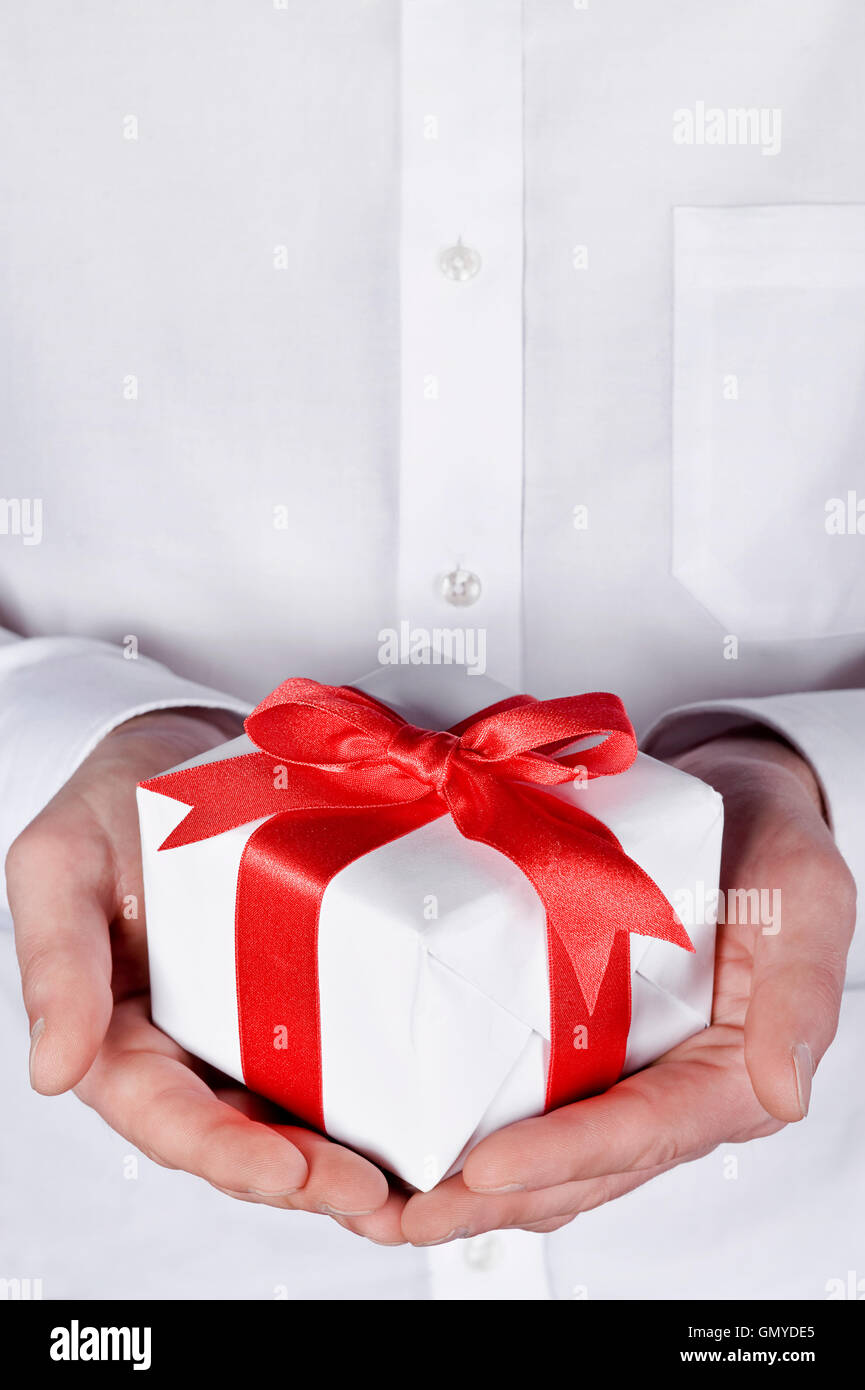 Gift giving gesture hi-res stock photography and images - Alamy