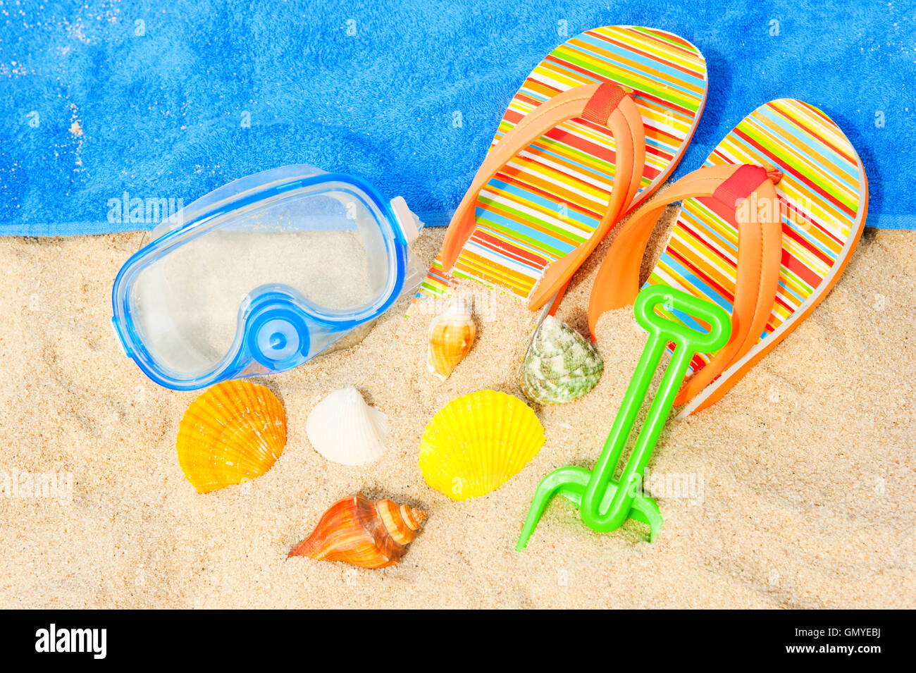 Seashells and diving mask on the beach Stock Photo - Alamy