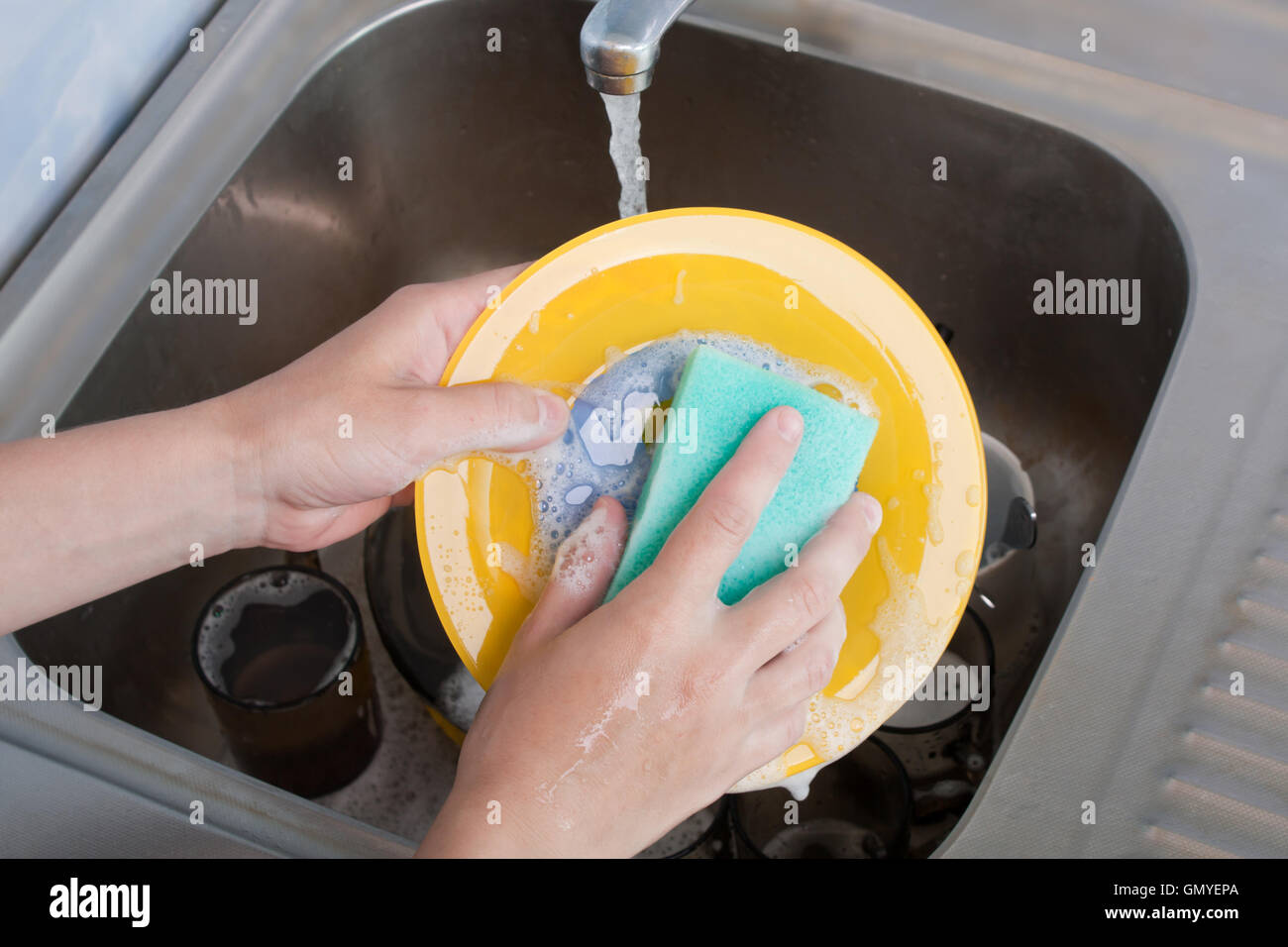 Dish cleaner hi-res stock photography and images - Alamy