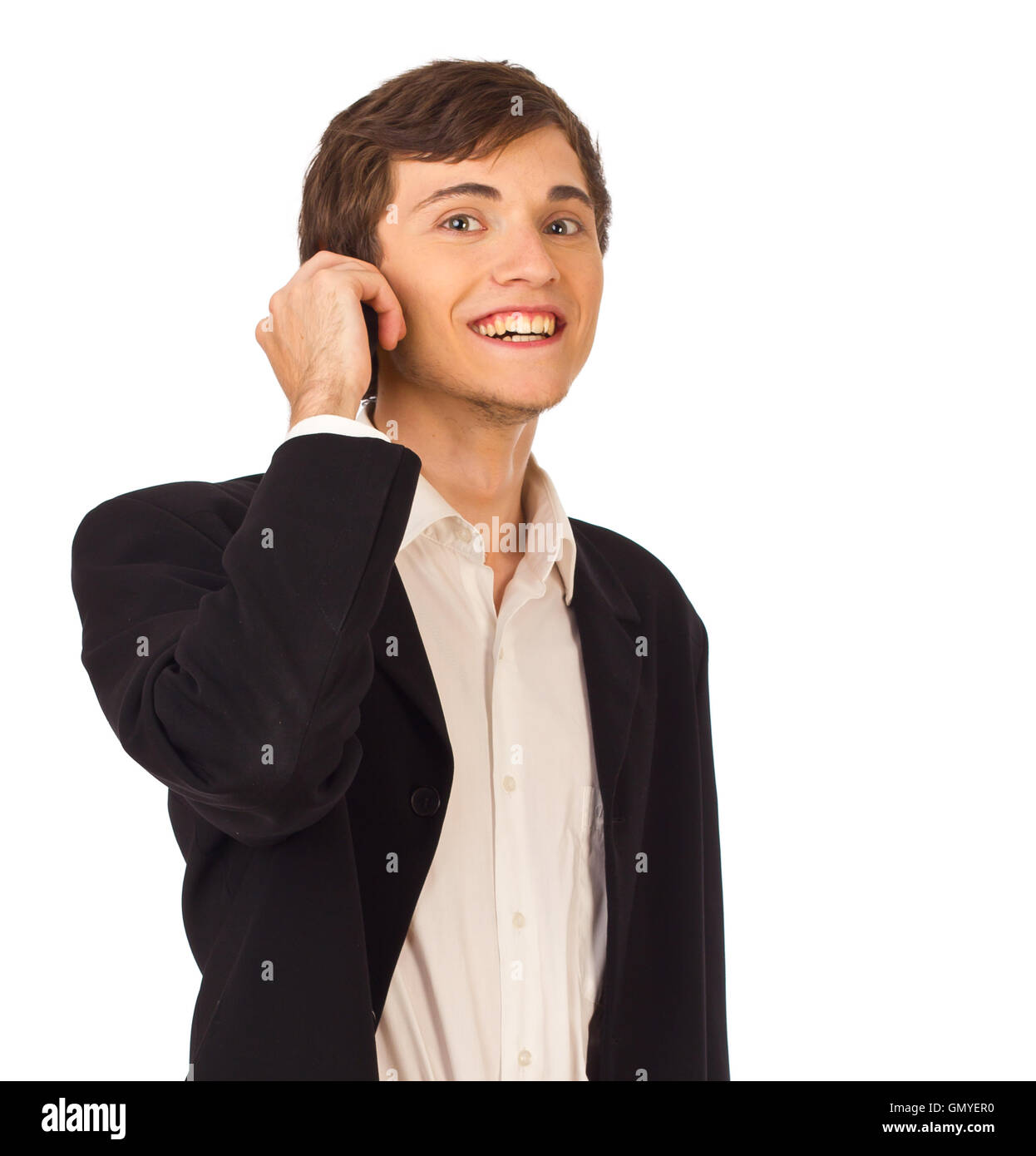 Happy smiling business man answering call Stock Photo - Alamy