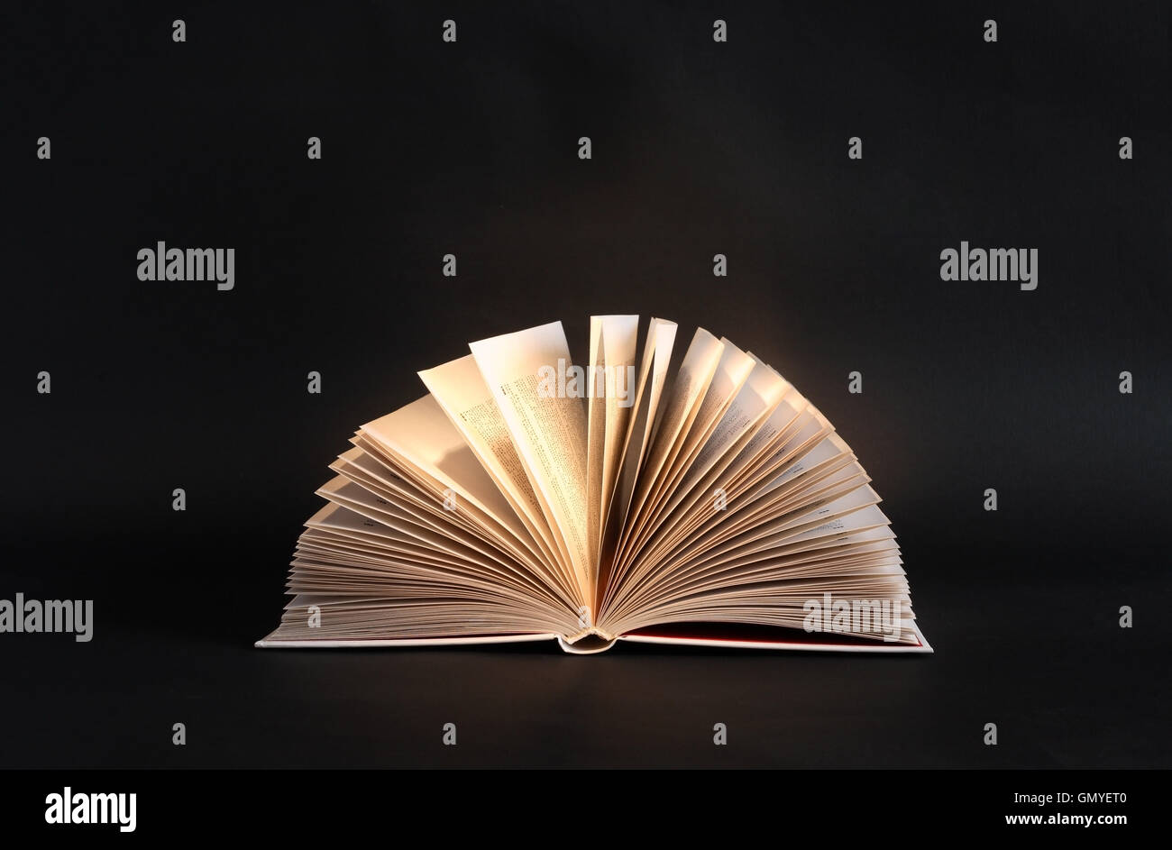Book On Dark Stock Photo - Alamy