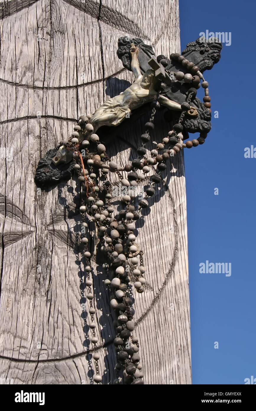 Rosaries and small cross Stock Photo - Alamy