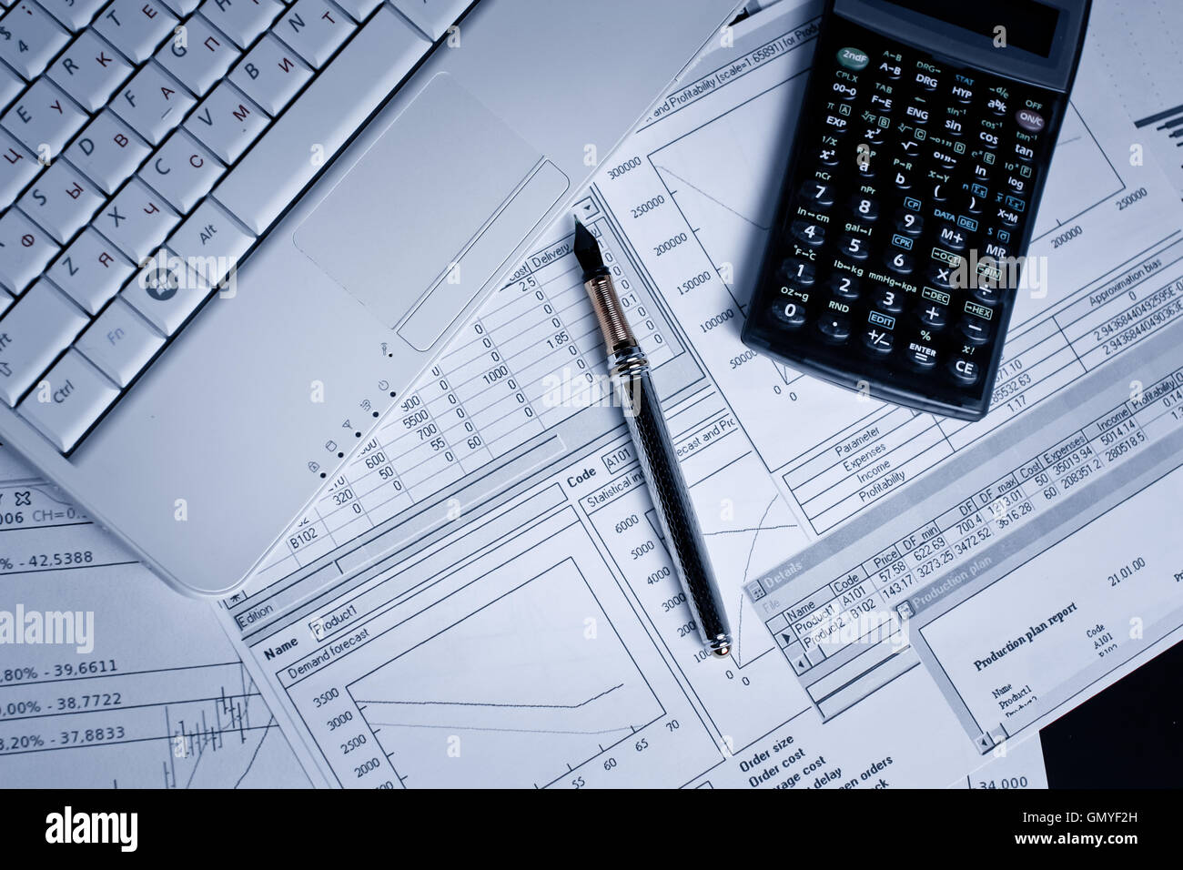 Analyzing financial charts and documents Stock Photo - Alamy