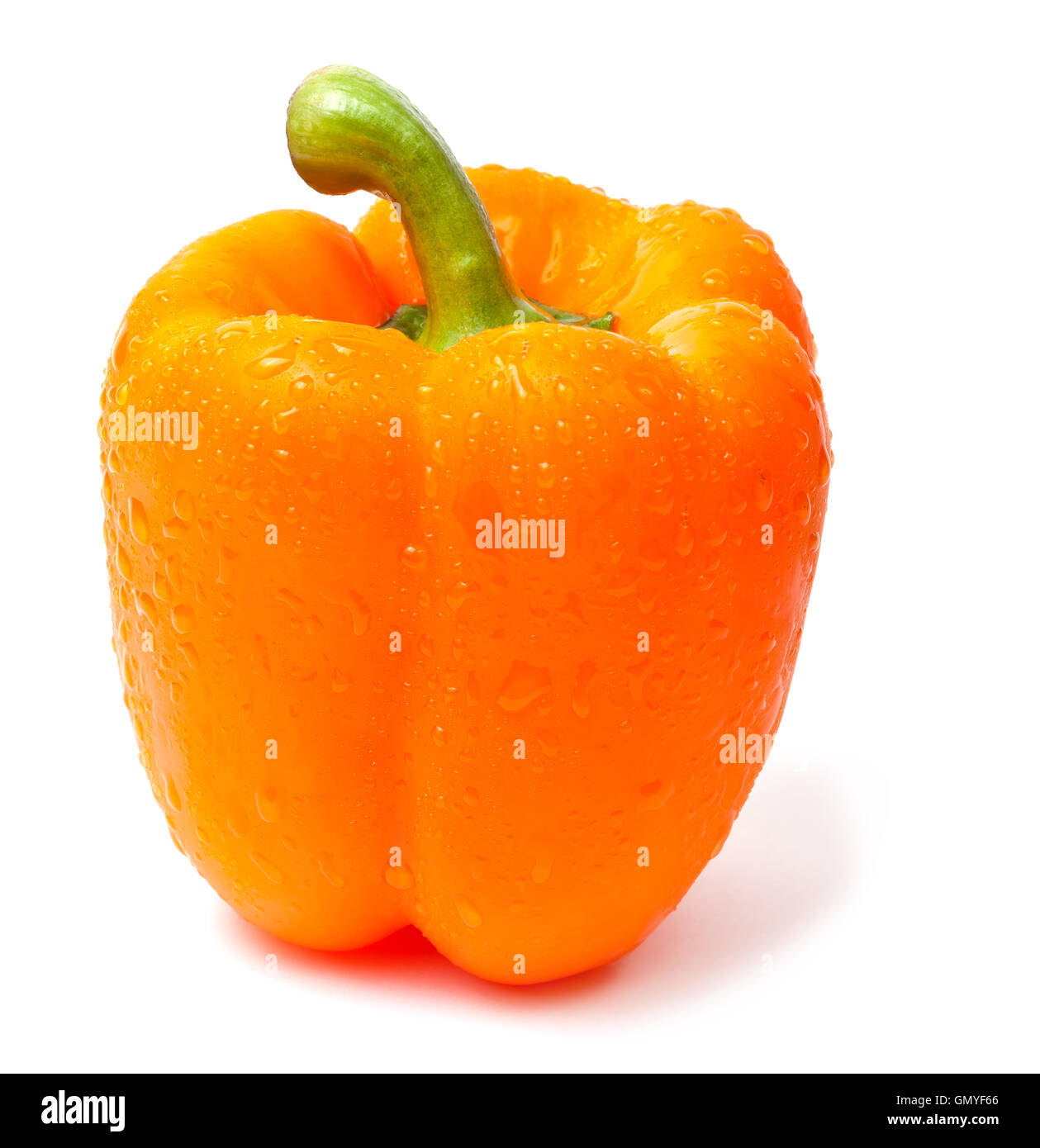 Single orange pepper on white background Stock Photo - Alamy
