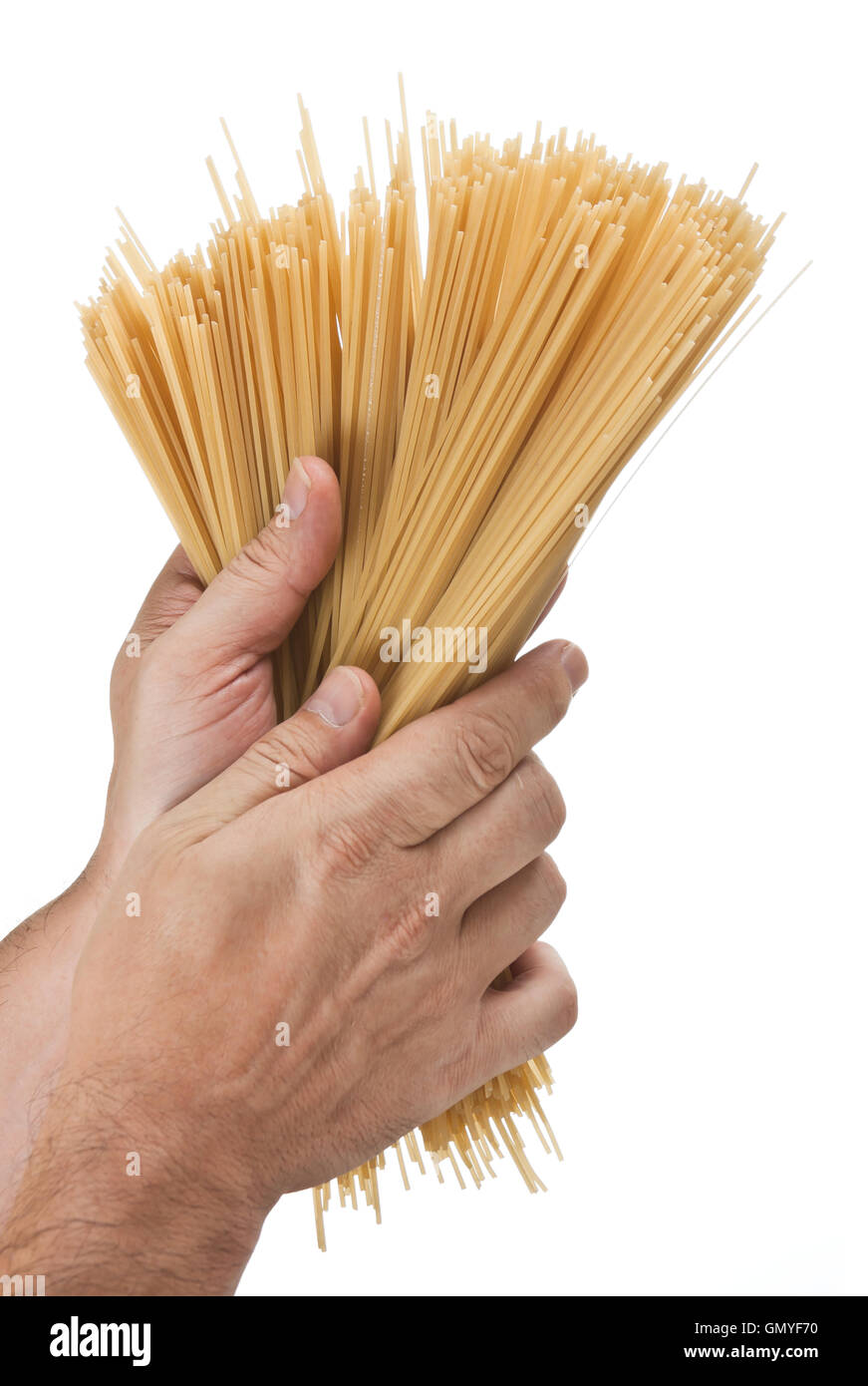 spaghetti in hands Stock Photo - Alamy