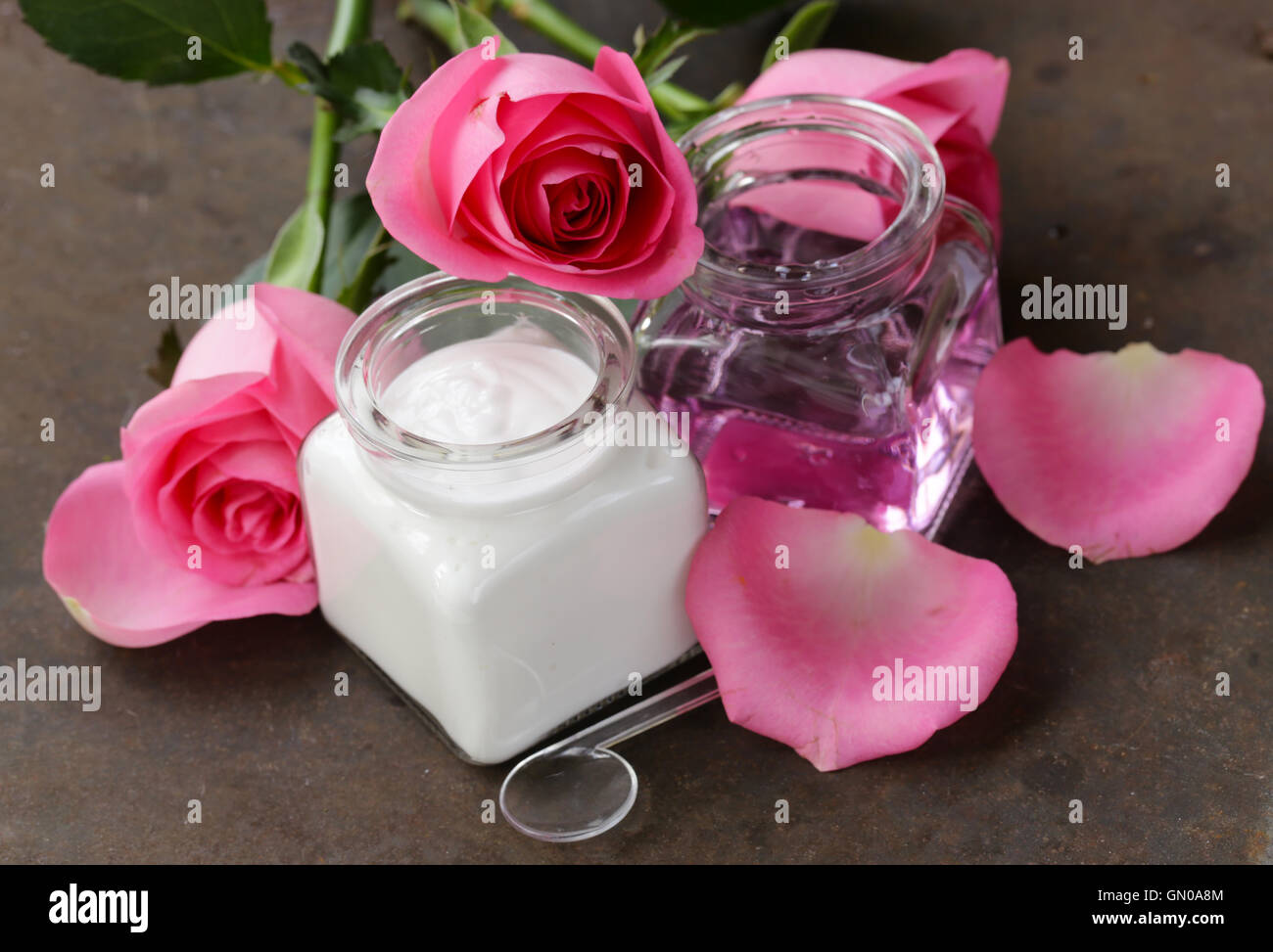Natural organic cosmetics cream and rose water Stock Photo - Alamy