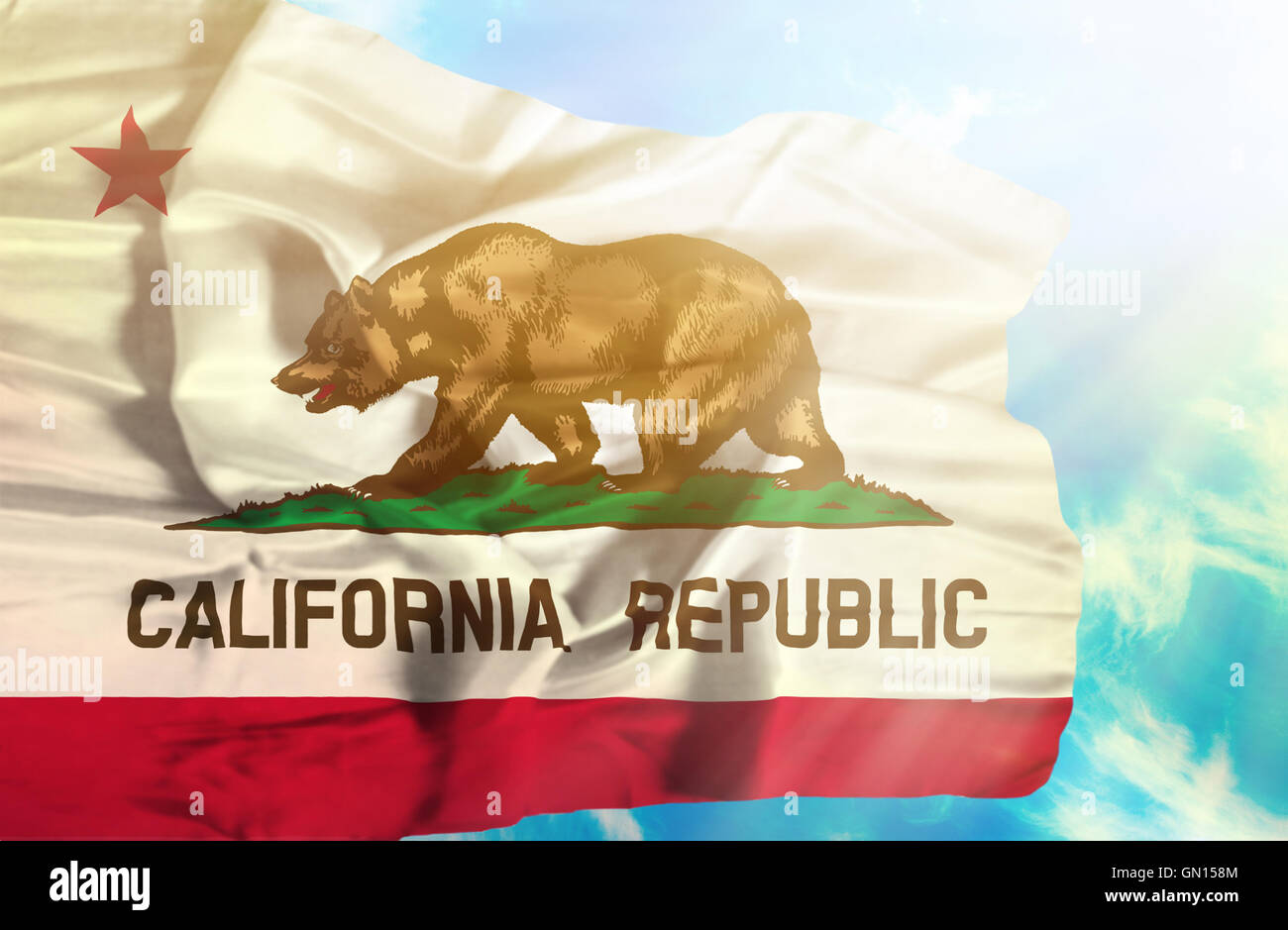 California waving flag against blue sky with sunrays Stock Photo - Alamy