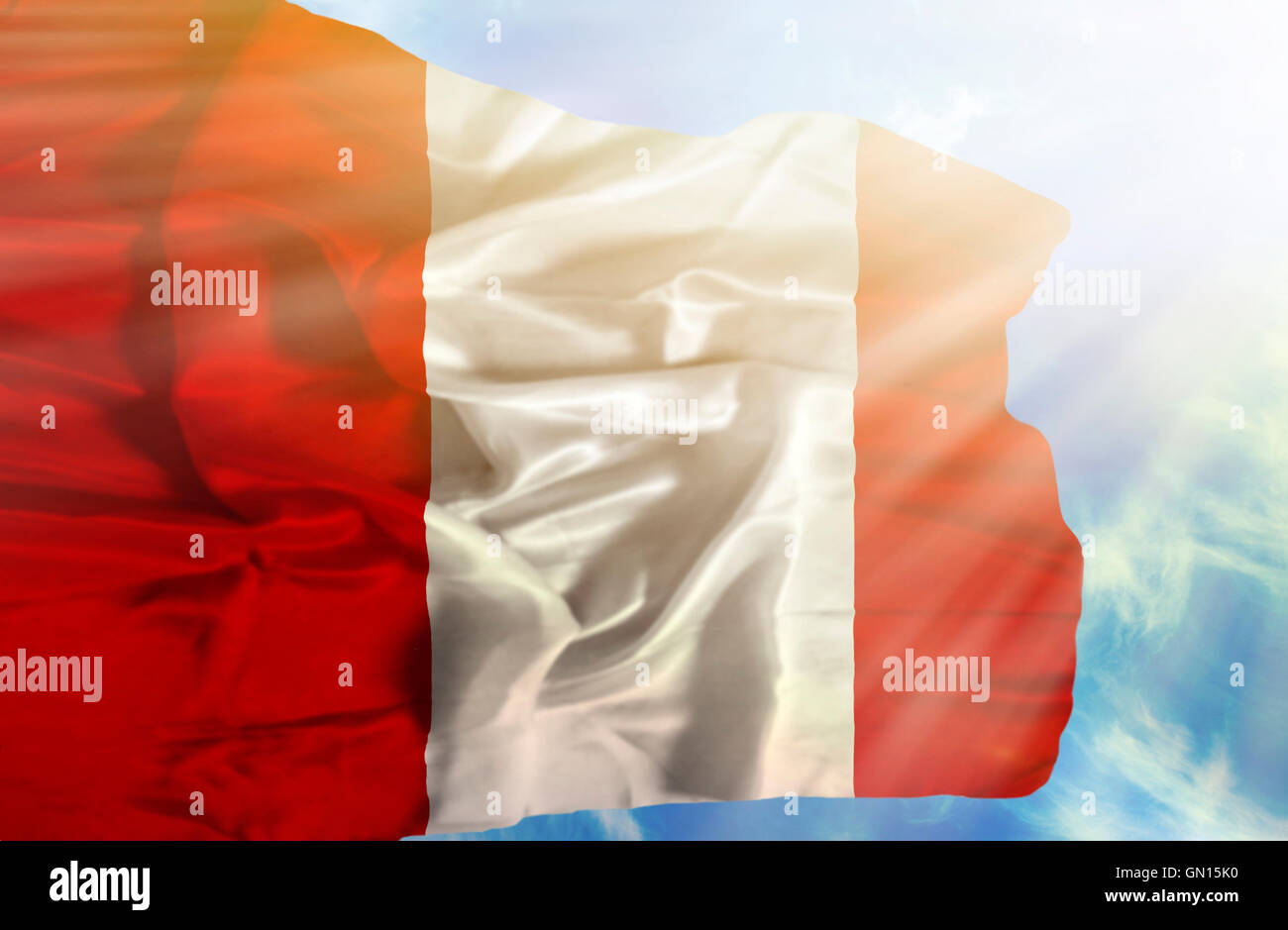 Peru waving flag against blue sky with sunrays Stock Photo - Alamy
