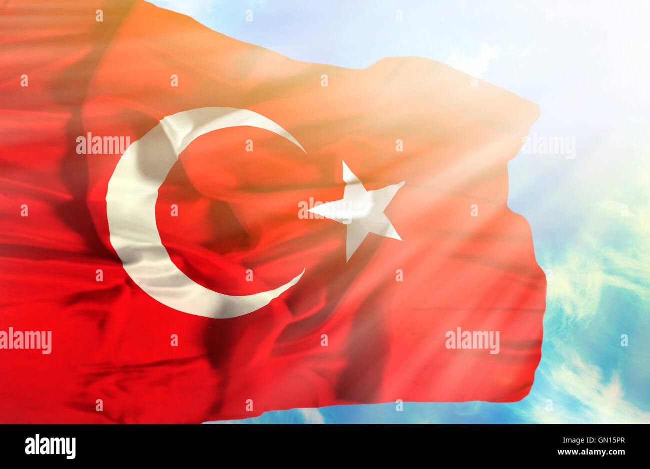 Turkey waving flag against blue sky with sunrays Stock Photo - Alamy