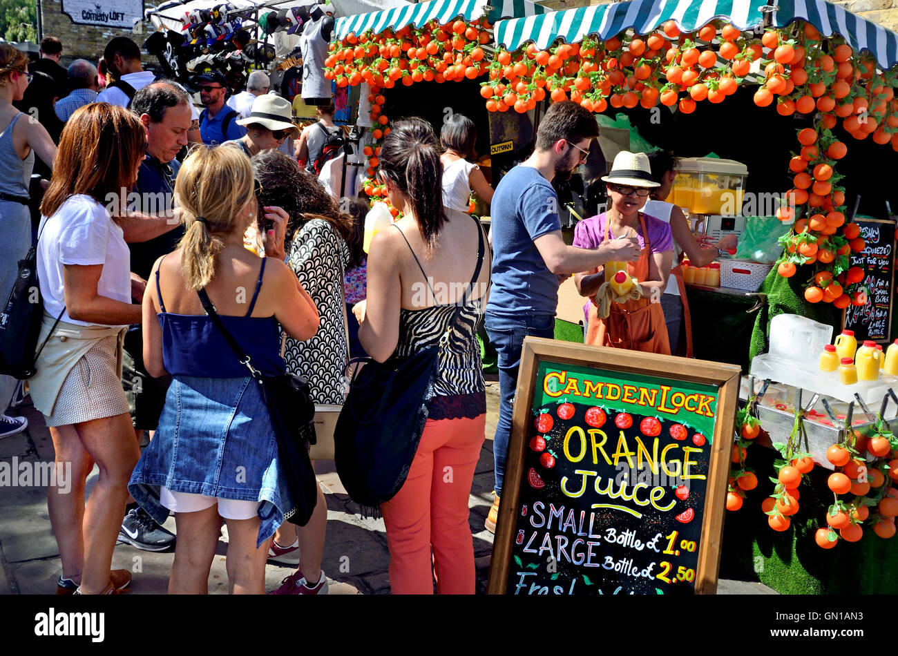 London England, UK. Camden: Orange juice stall in Camden Lock Market ...