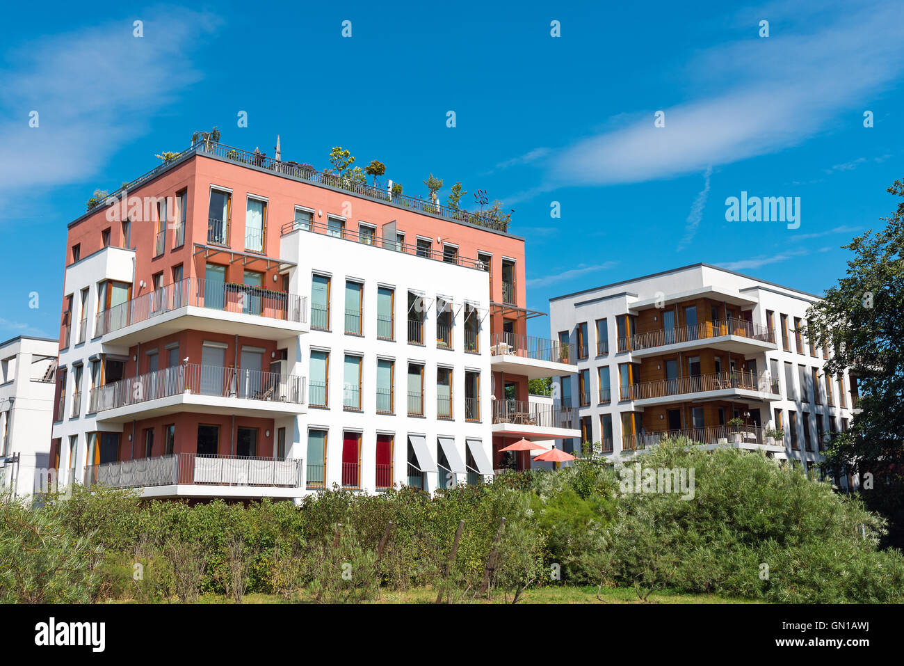 Modern townhouses with garden seen in Berlin, Germany Stock Photo - Alamy