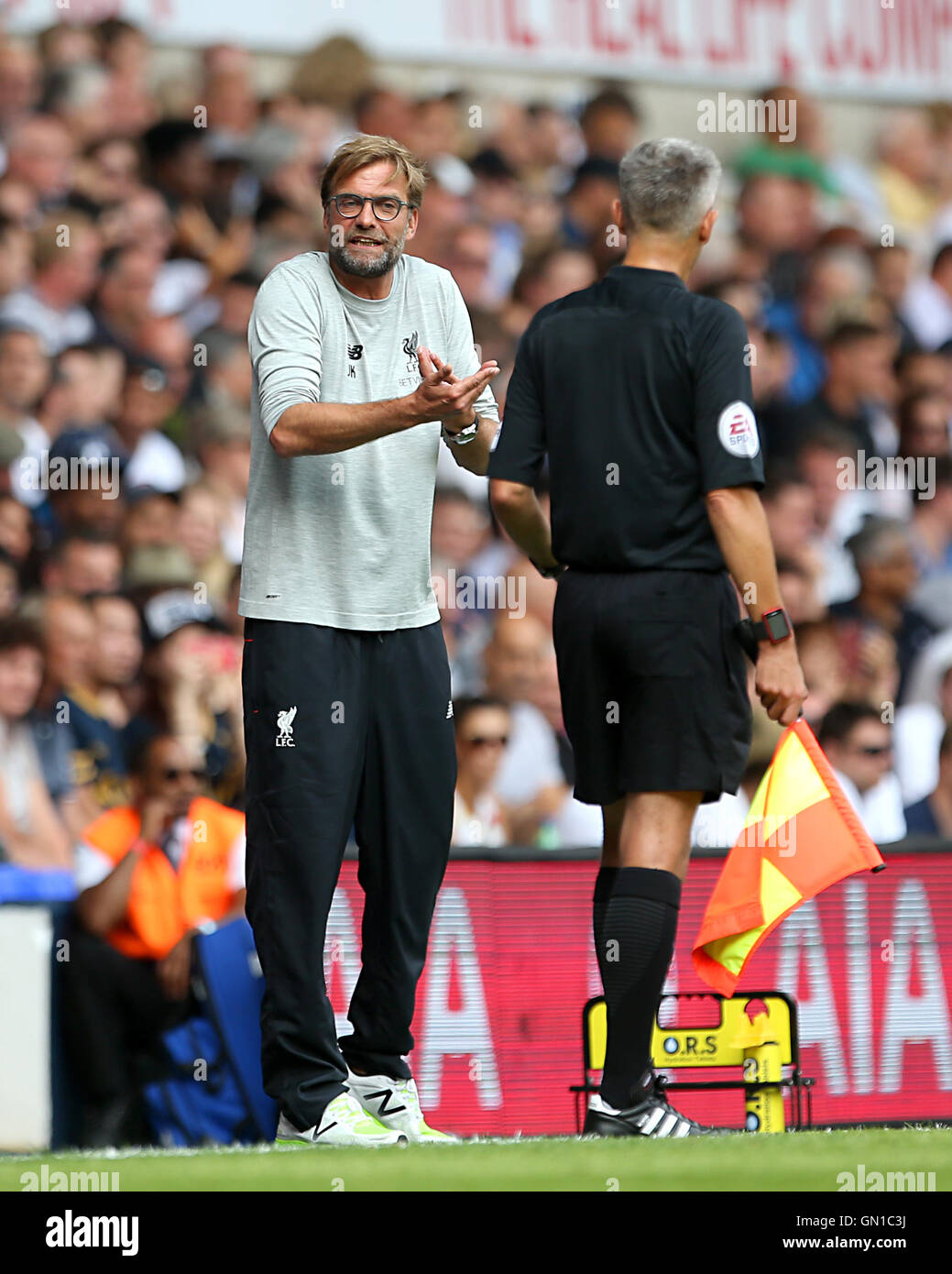 Liverpool manager Jurgen Klopp speaks to the fourth official during the ...