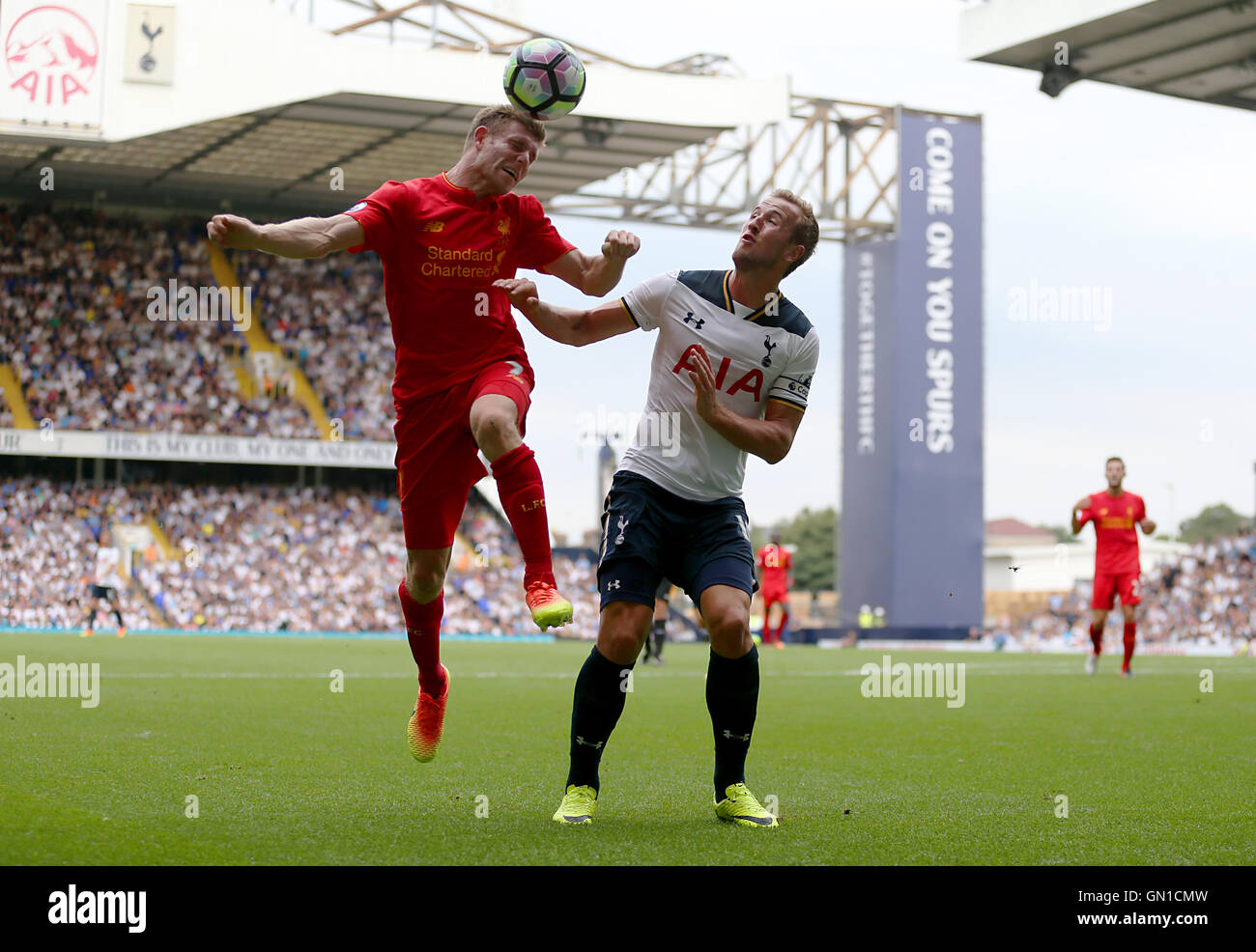 Liverpool's James Milner (left) and Tottenham Hotspur's Harry Kane ...