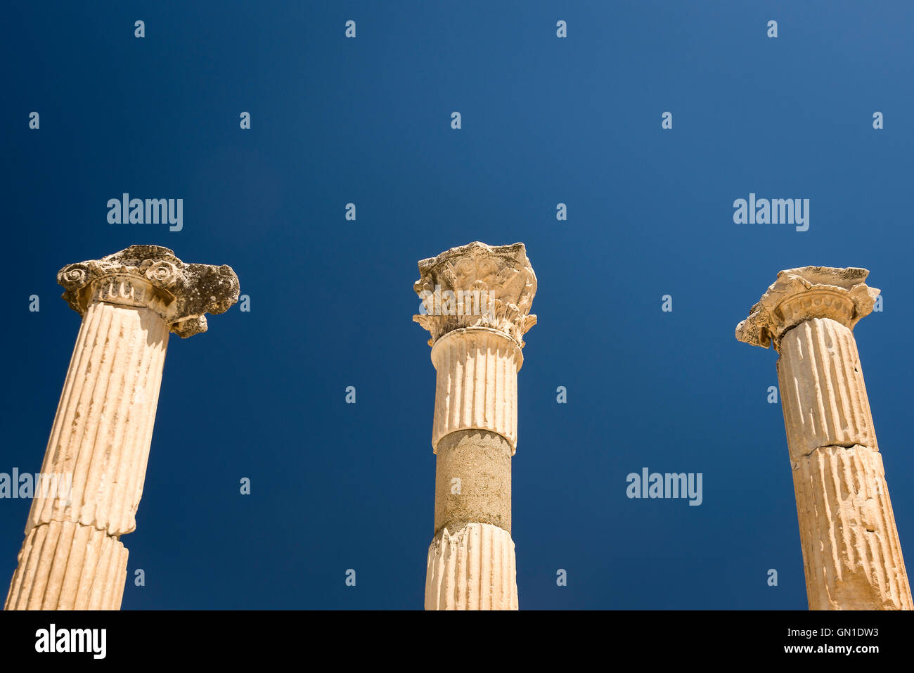 Three Columns from The ancient city of Ephesus Stock Photo - Alamy