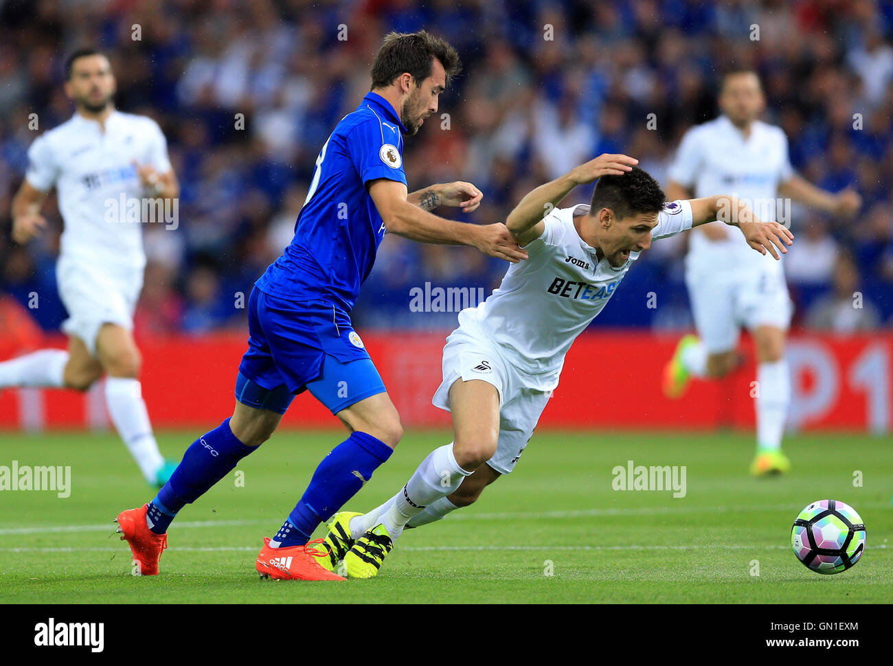 Leicester City's Christian Fuchs (left) and Swansea City's Federico ...