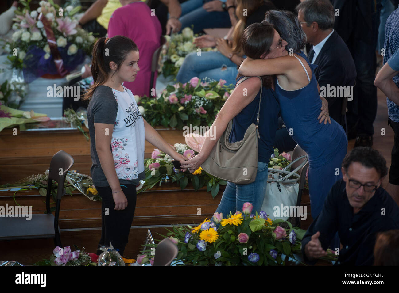 Funerals of the victims of the earthquake hi-res stock photography and ...