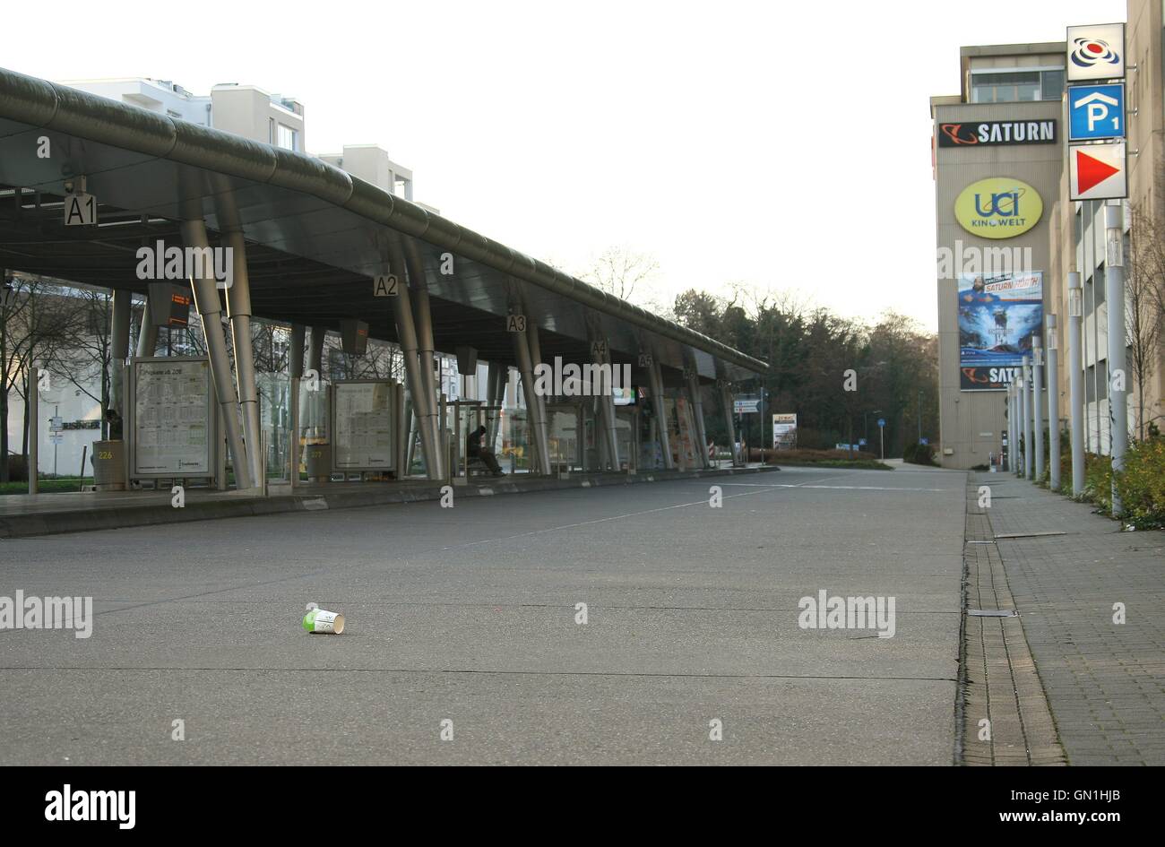 Empty Hurth Park bus station shopping precinct in the Hurth district in ...